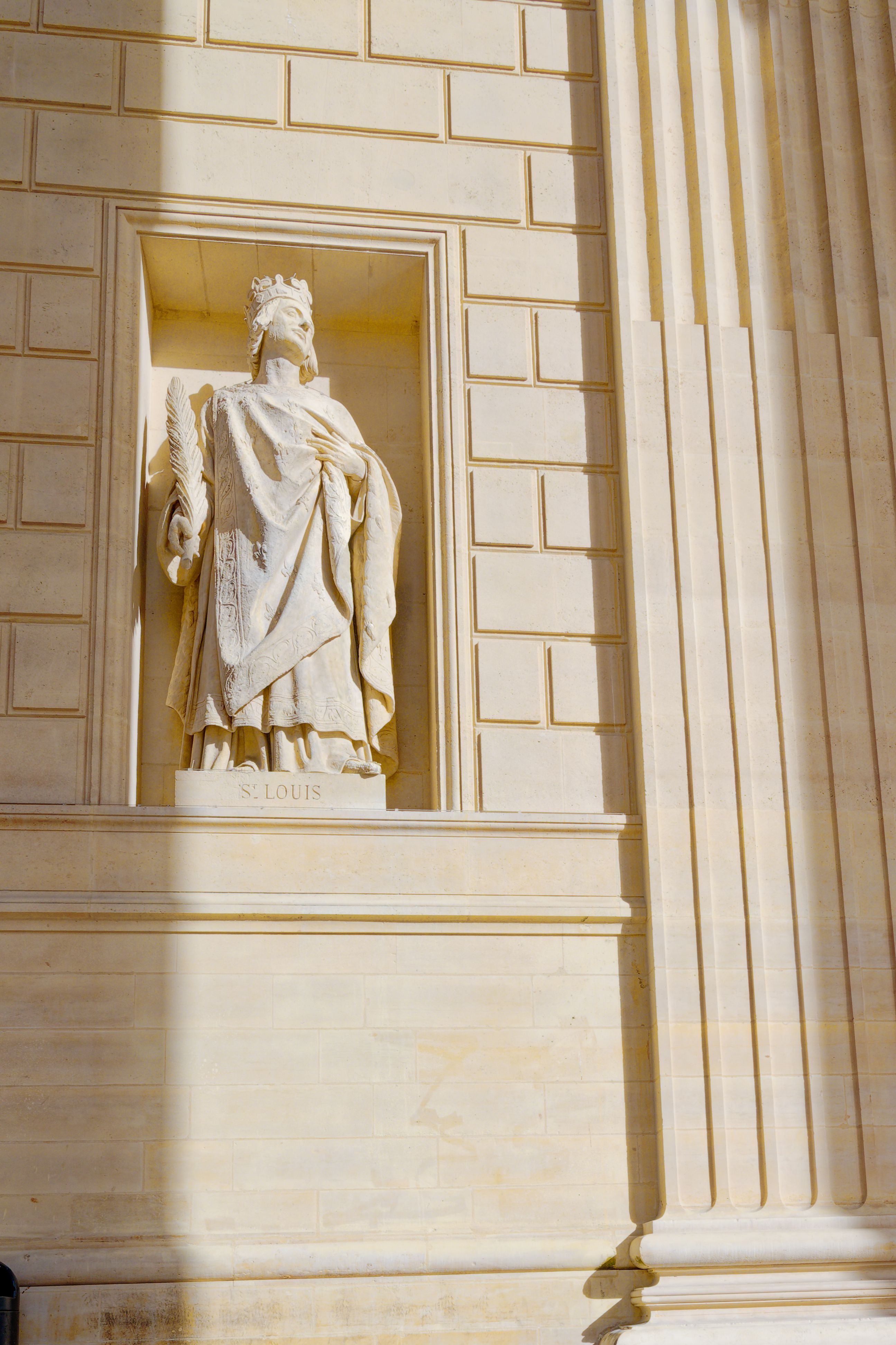 Antique statue in historic interior with ornate walls and ceiling ...