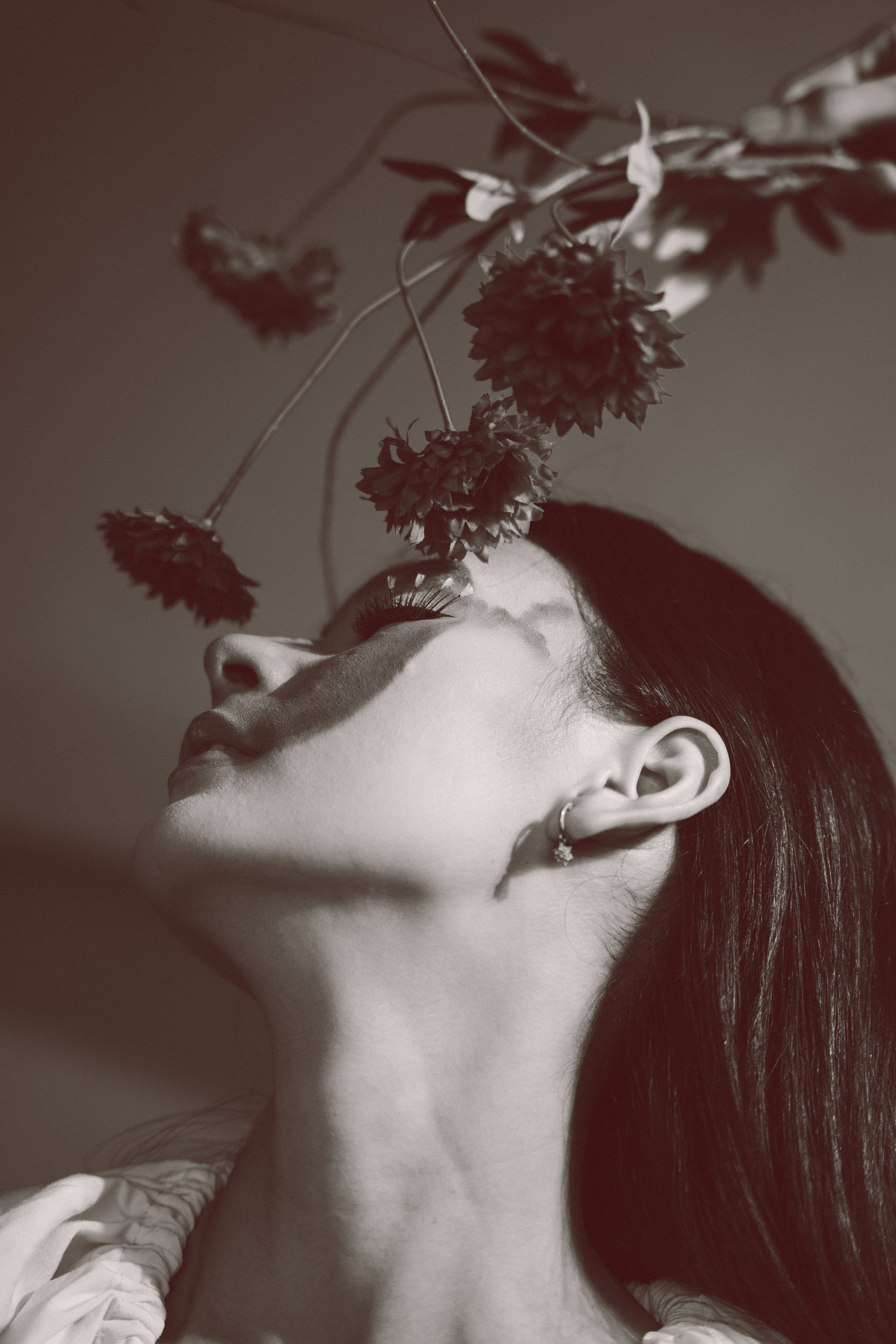 Artistic Portrait with Floral Shadow Play · Free Stock Photo