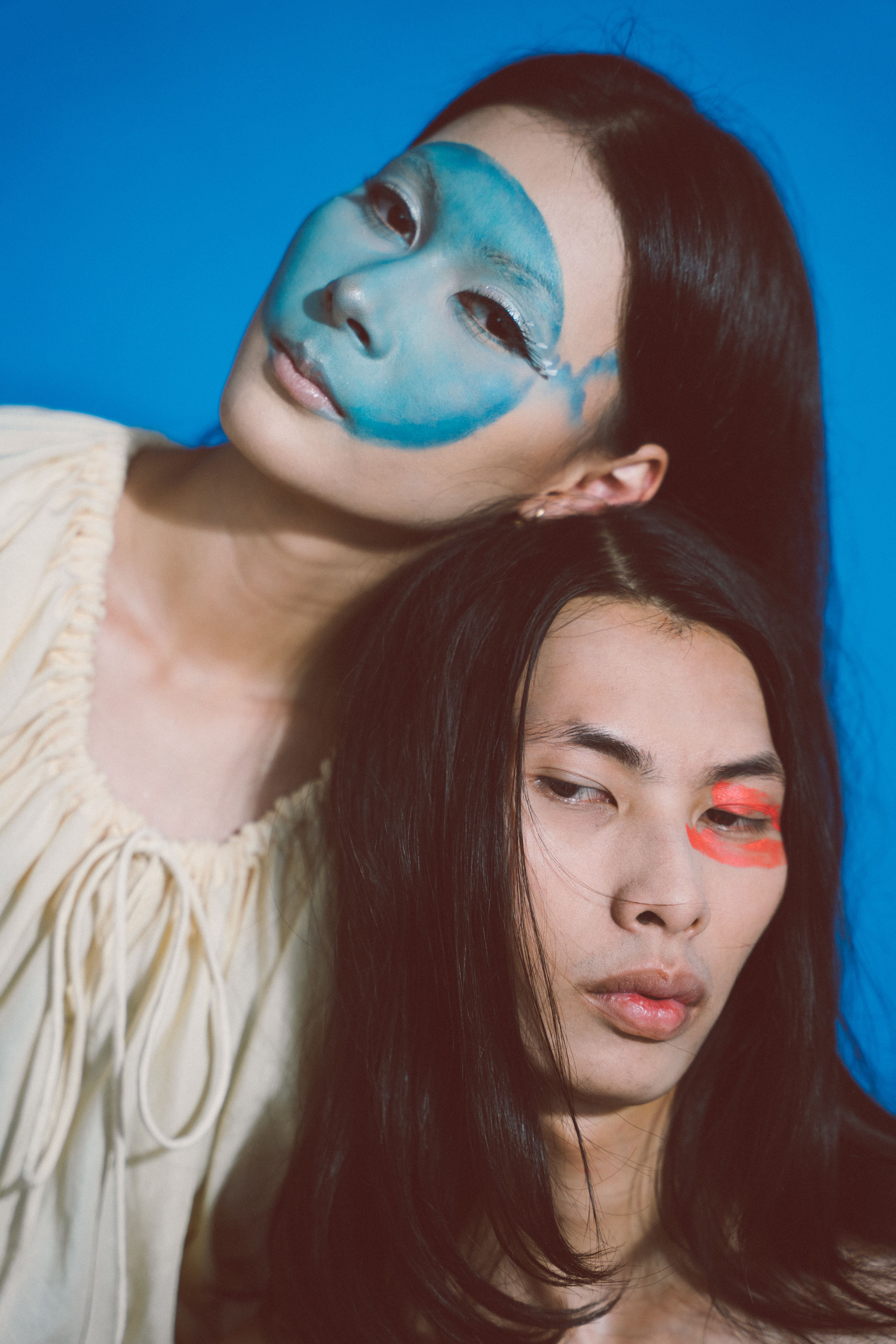 Artistic Portrait of Two People with Face Paint · Free Stock Photo