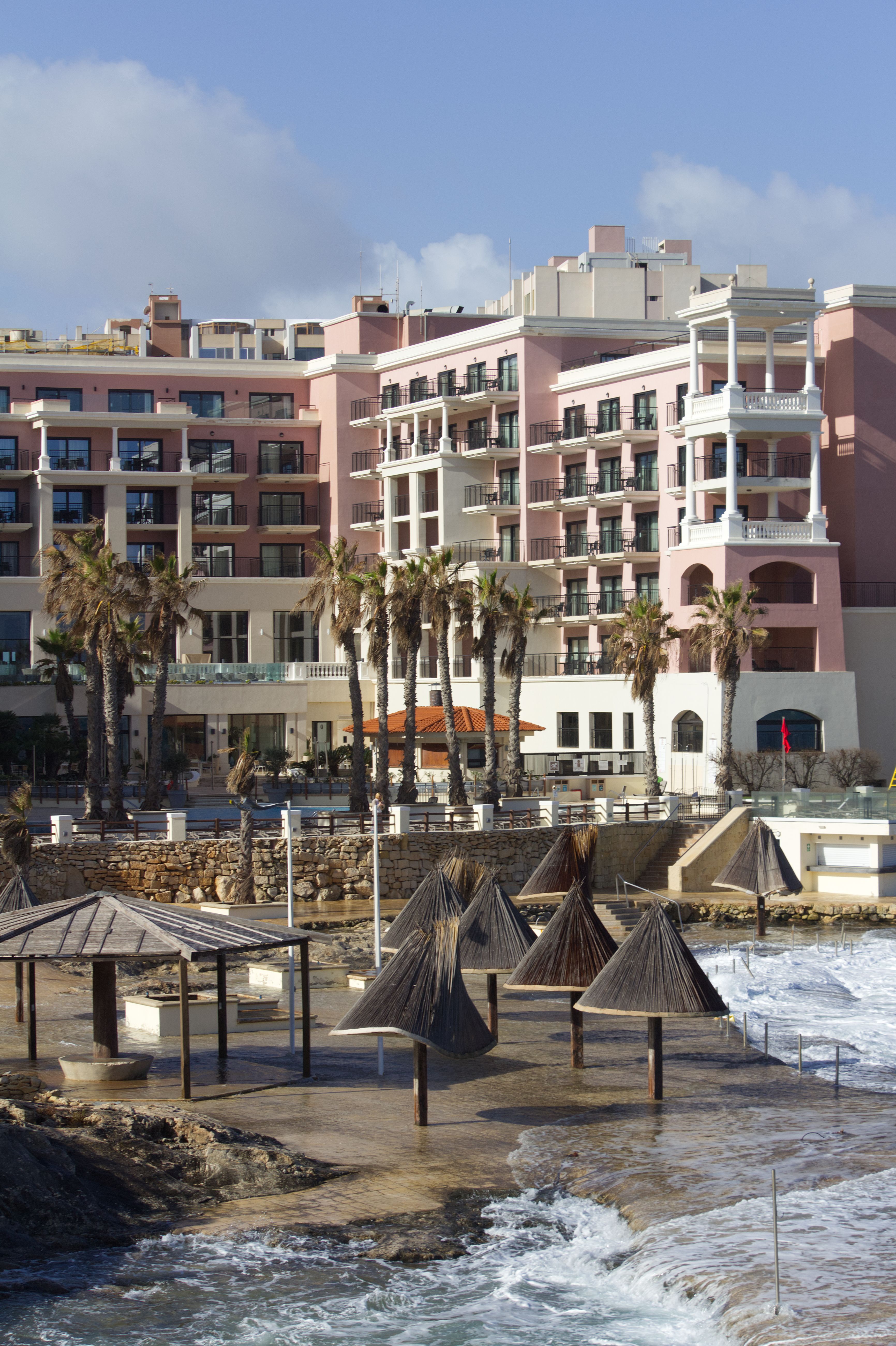 Luxurious Seaside Resort in Malta with Pink Facade · Free Stock Photo