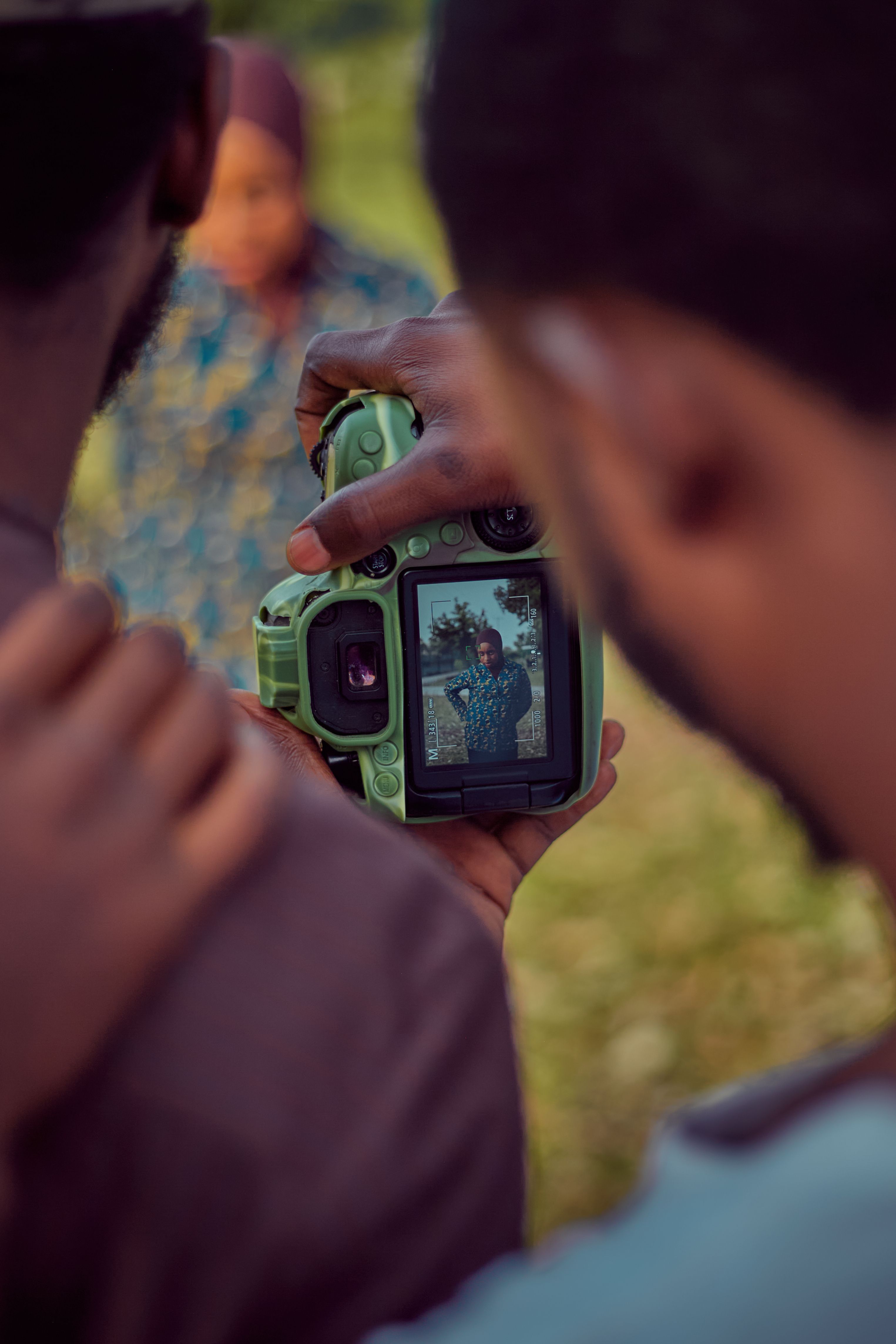 Capturing Portrait Photography Session Outdoors · Free Stock Photo