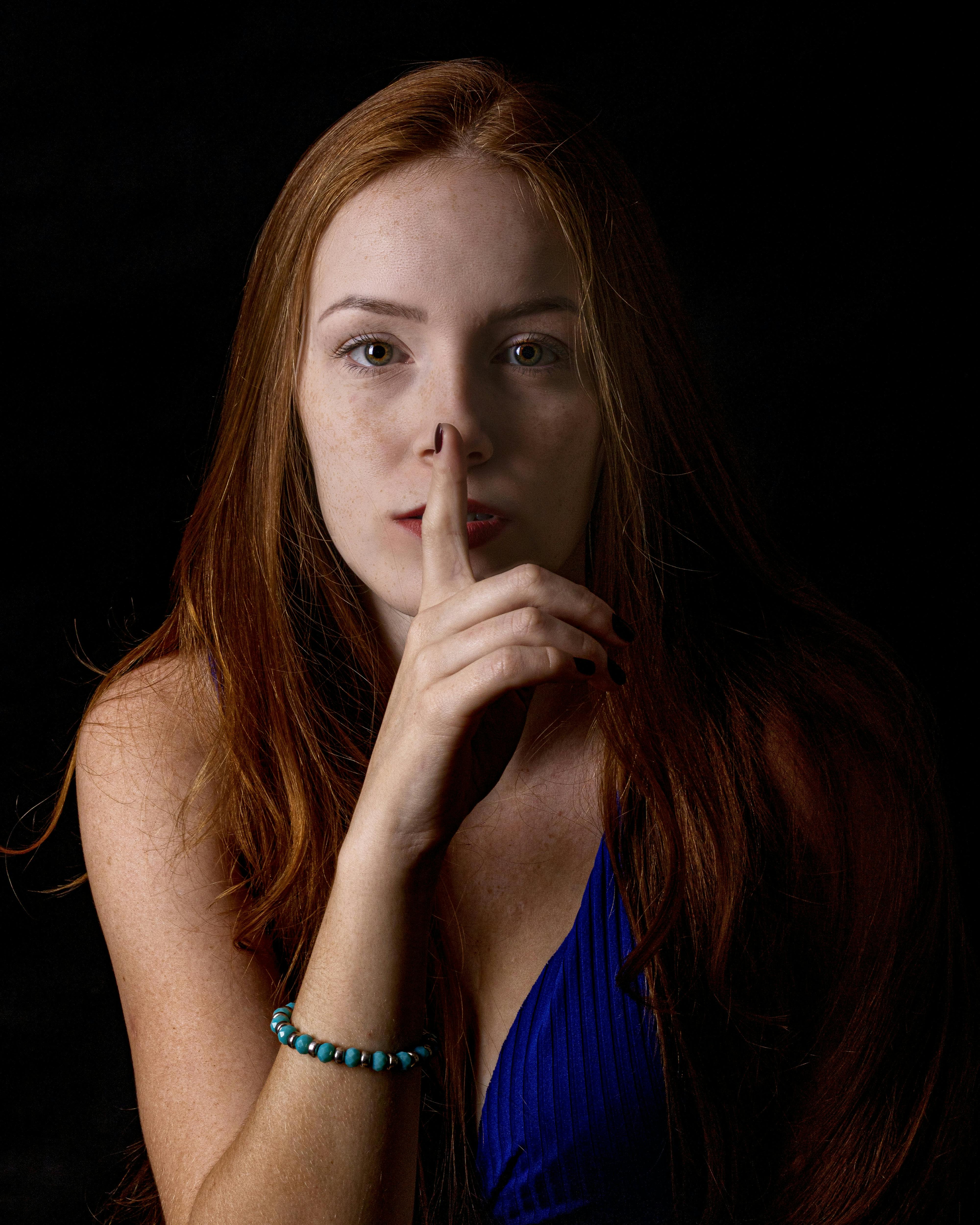 Woman Doing A Quiet Hand Sign · Free Stock Photo