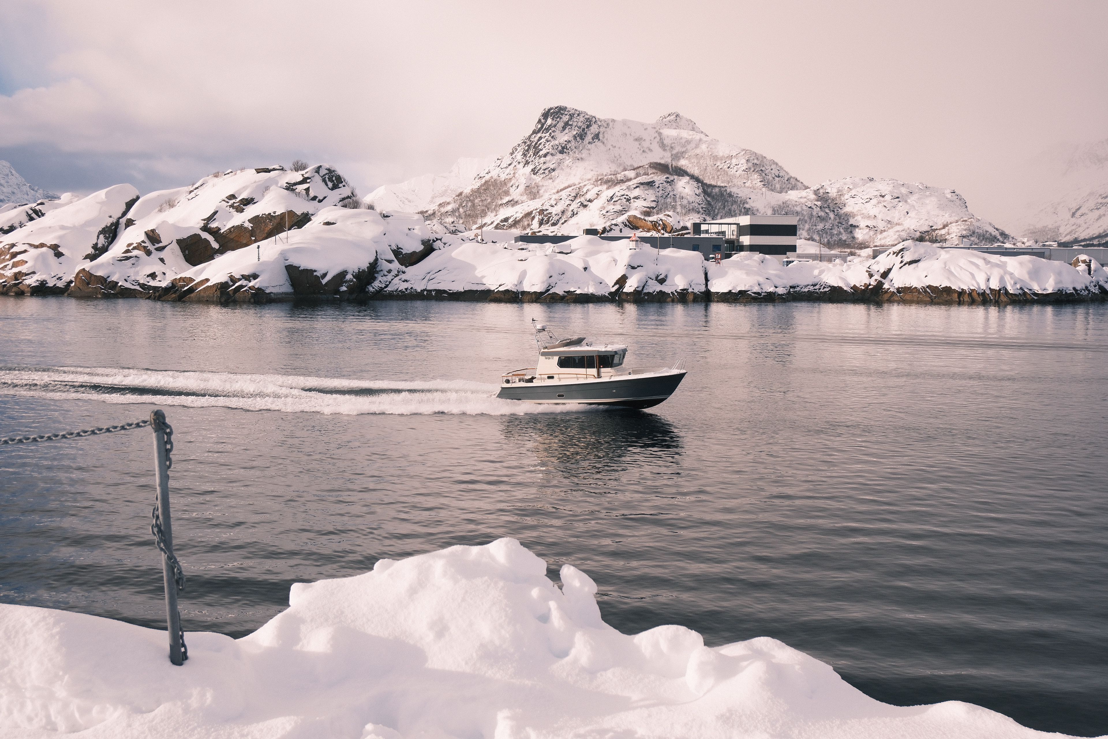 Snowy Fjord with Boat in Winter, Svolvær, Norway · Free Stock Photo
