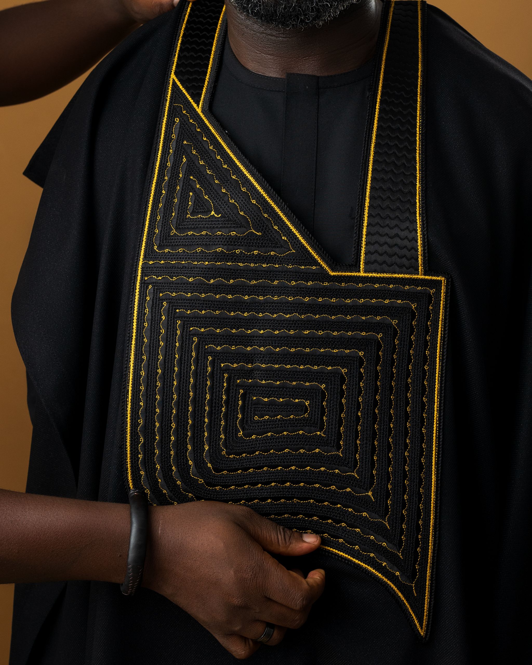 Traditional Ghanaian attire with intricate embroidery · Free Stock Photo