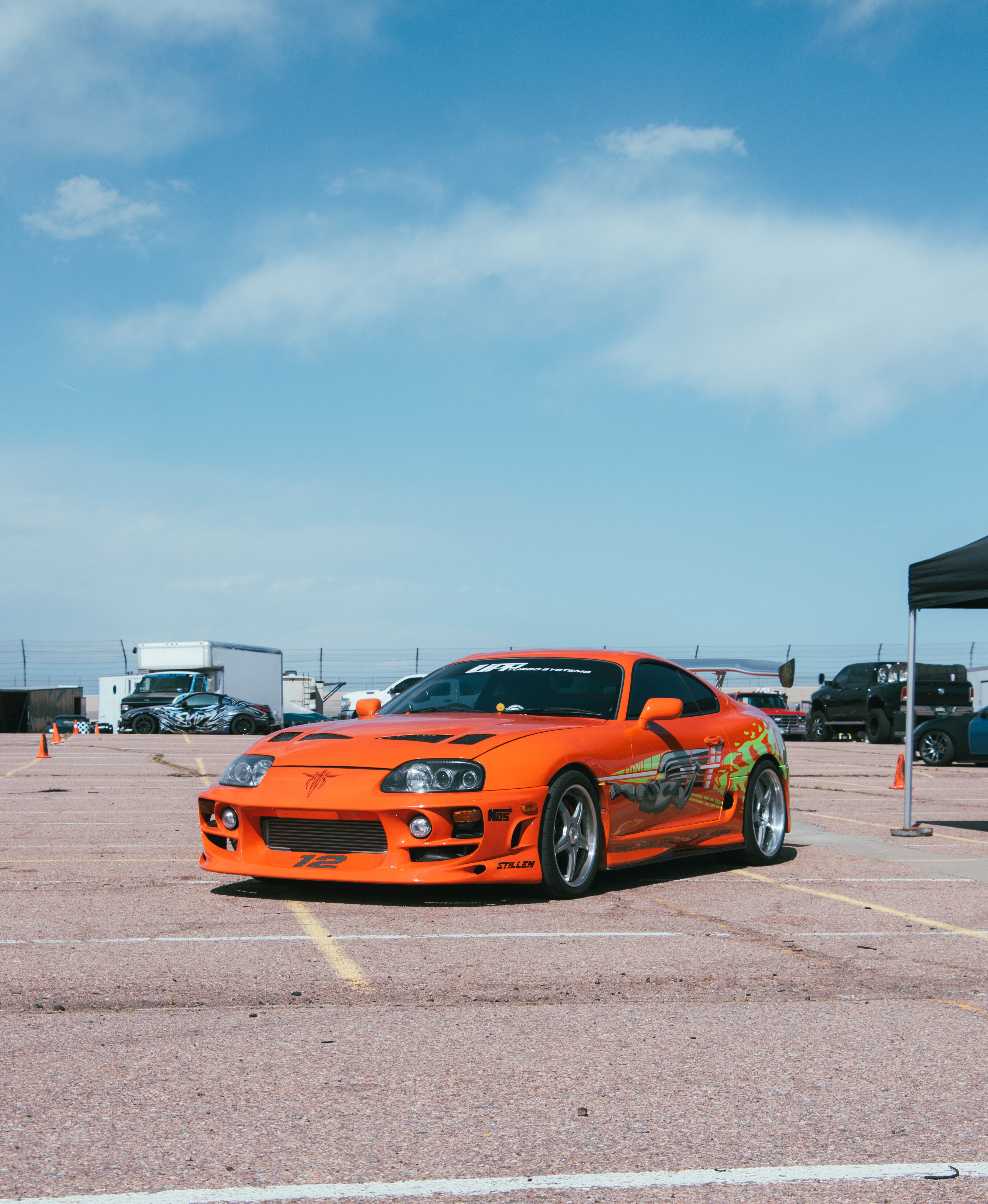 Toyota Supra Naranja Brillante En Un Evento De Pista · Foto de stock ...