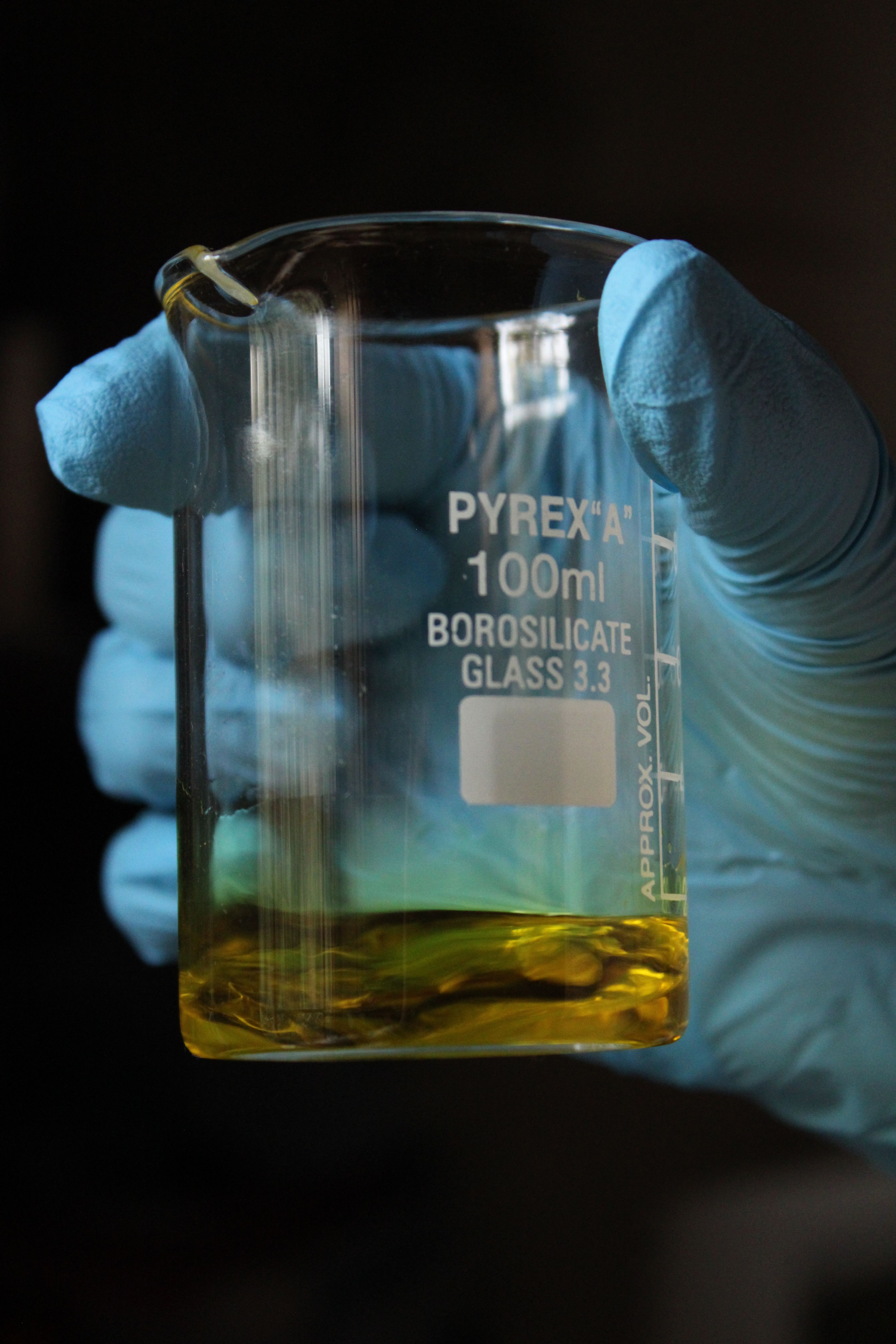Close-Up of Laboratory Beaker with Liquid · Free Stock Photo