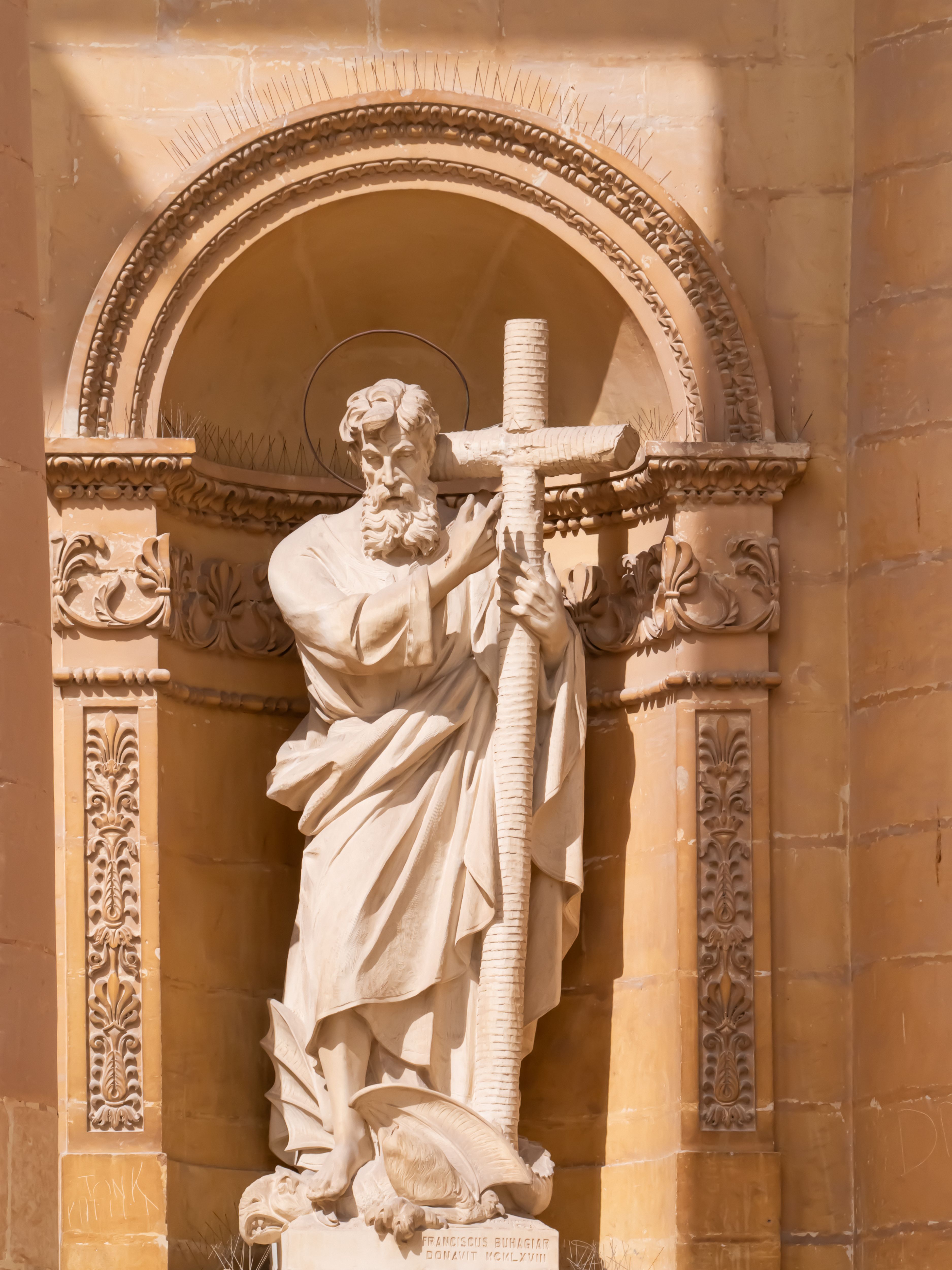 Ancient Maltese Statue with Religious Iconography · Free Stock Photo