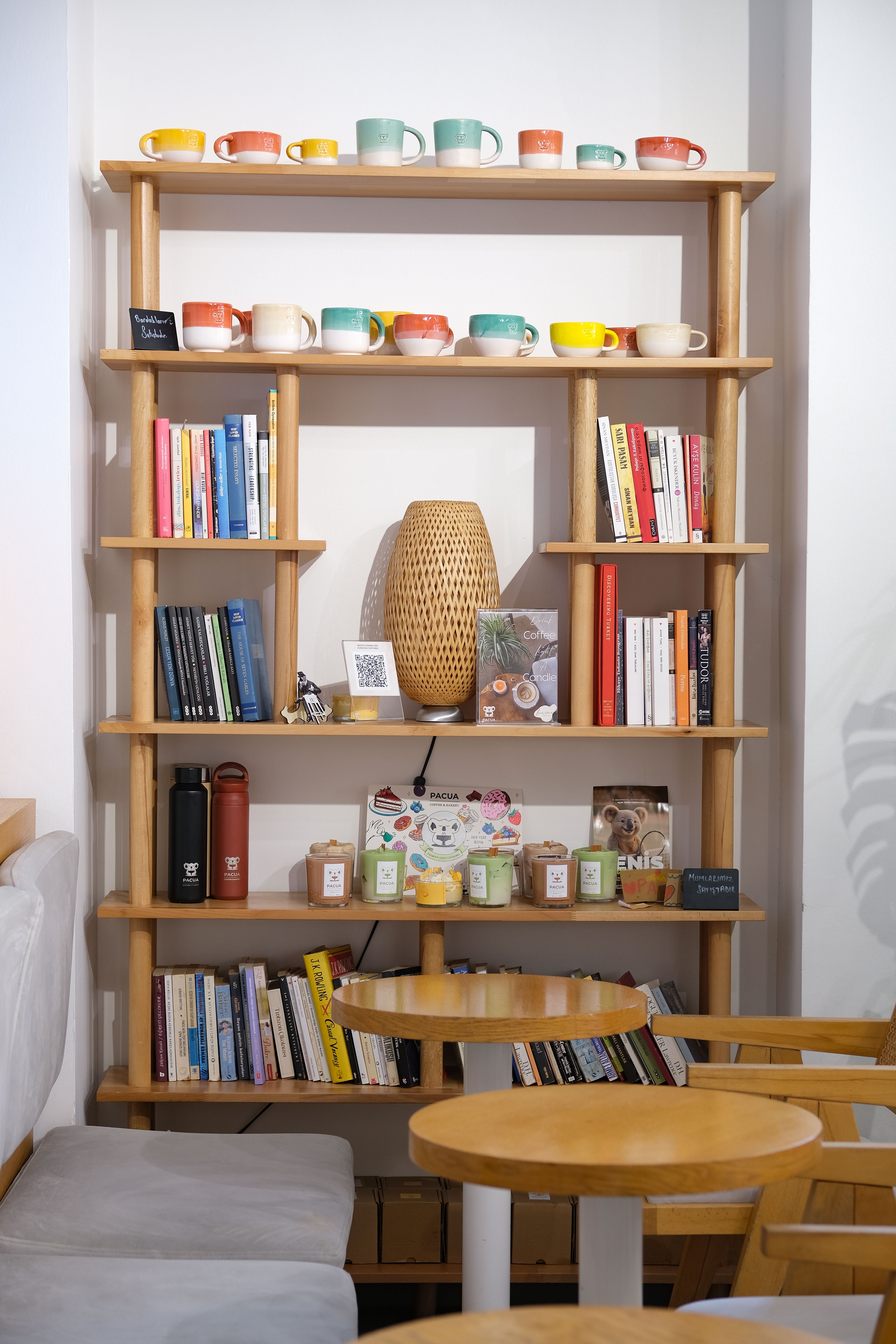 Cozy Cafe Bookshelf with Colorful Mugs in Istanbul · Free Stock Photo