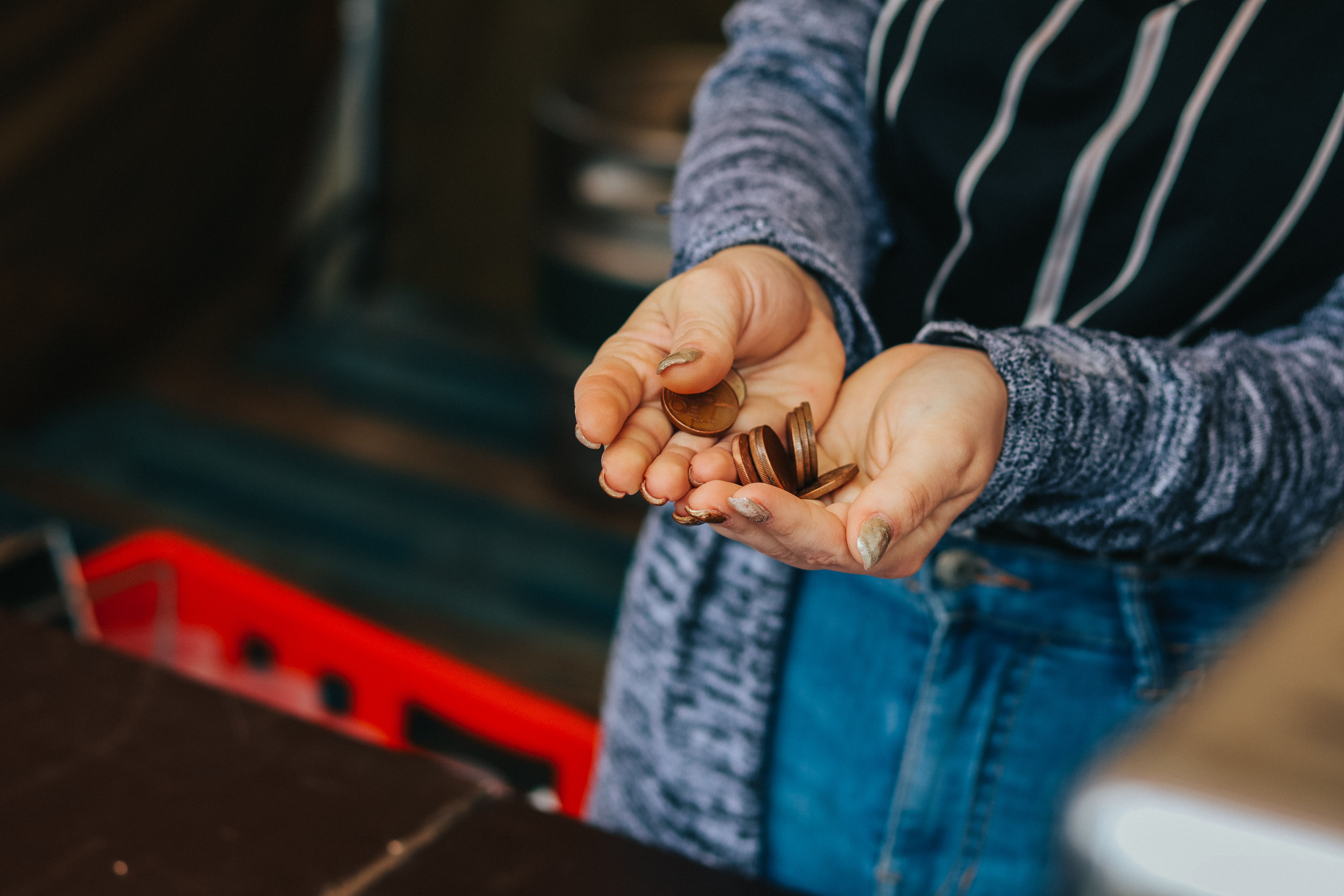 Person Holding Coins · Free Stock Photo
