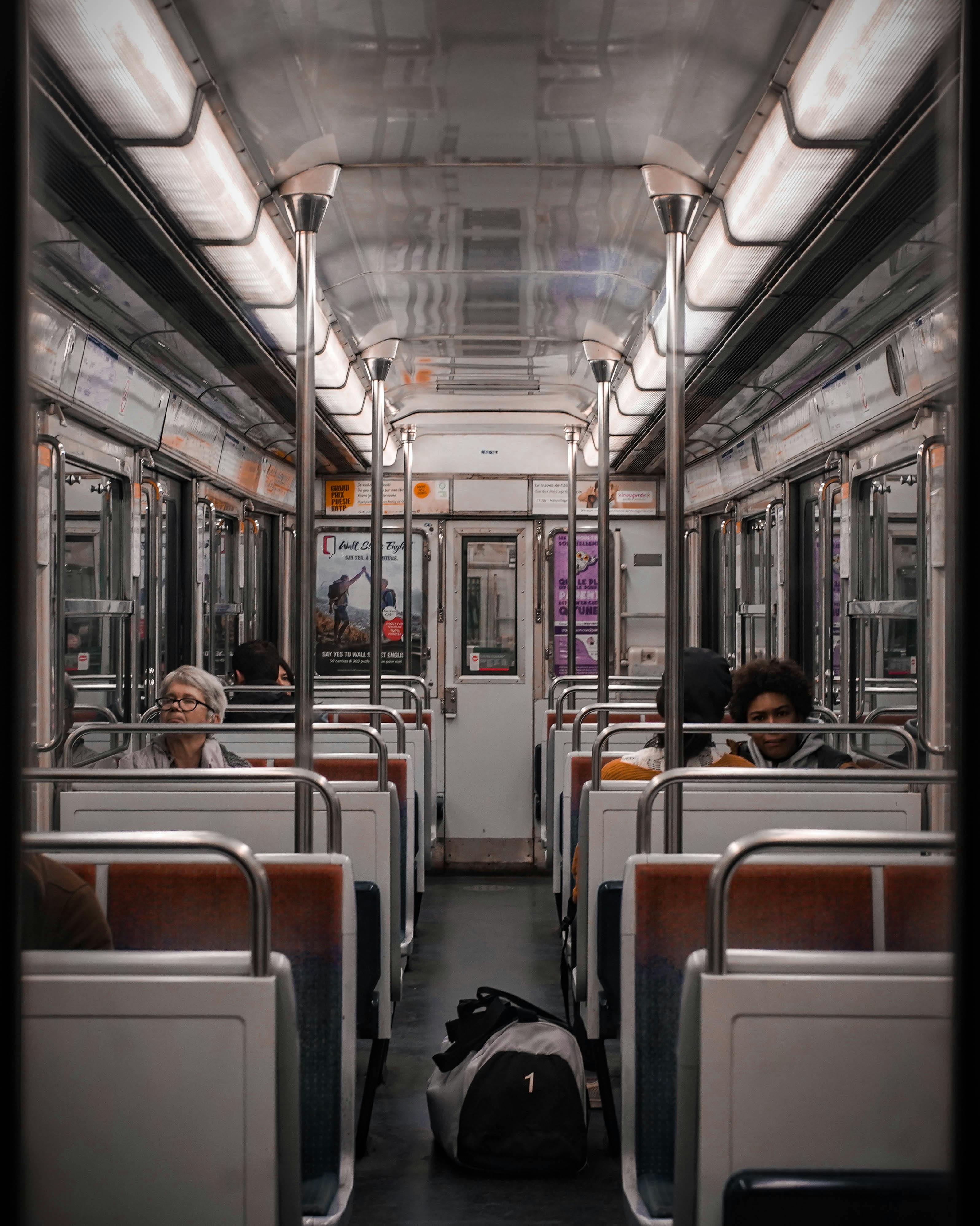 Photo Of People Sitting Inside Train · Free Stock Photo