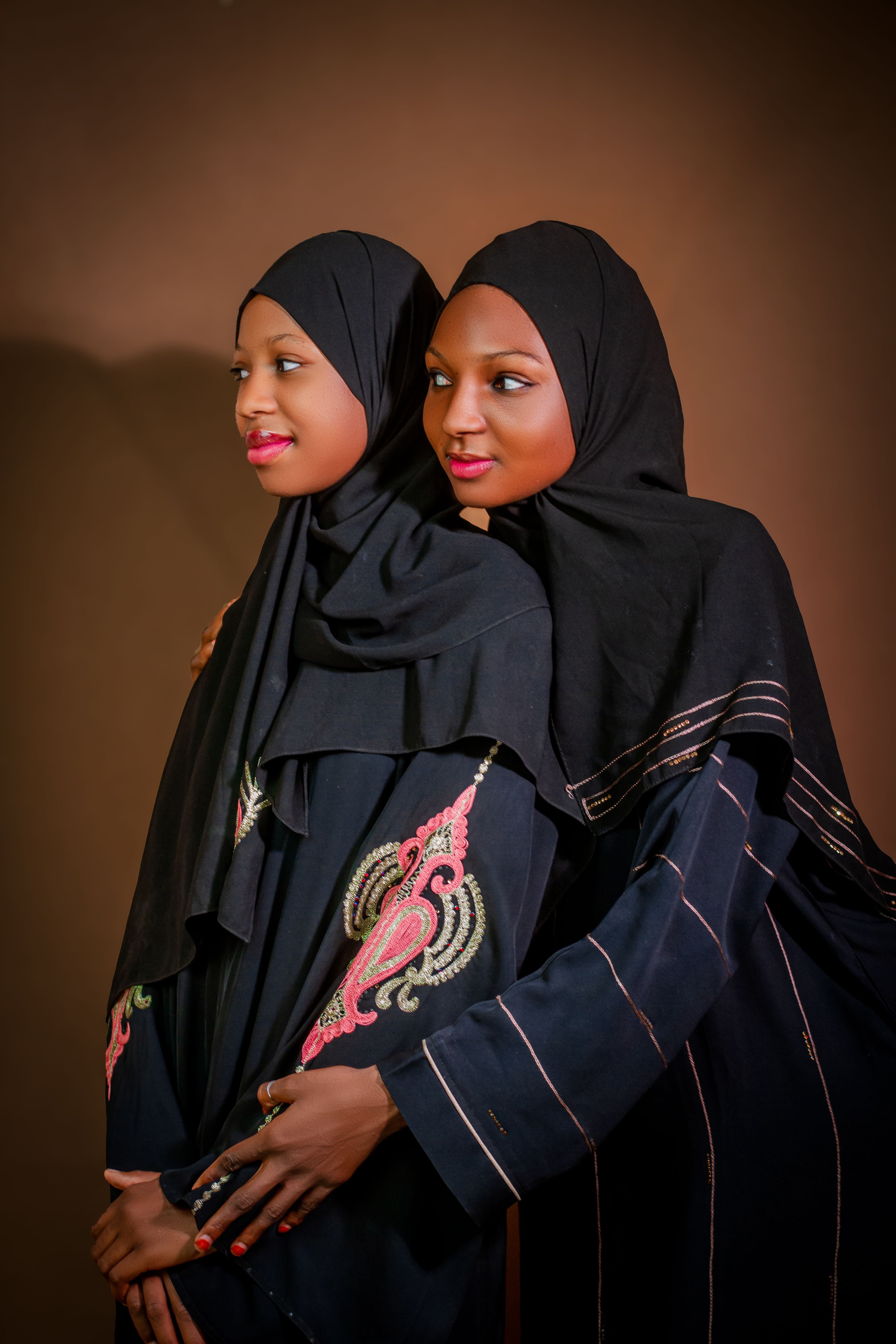 Elegant Portrait of Two Women in Traditional Attire · Free Stock Photo