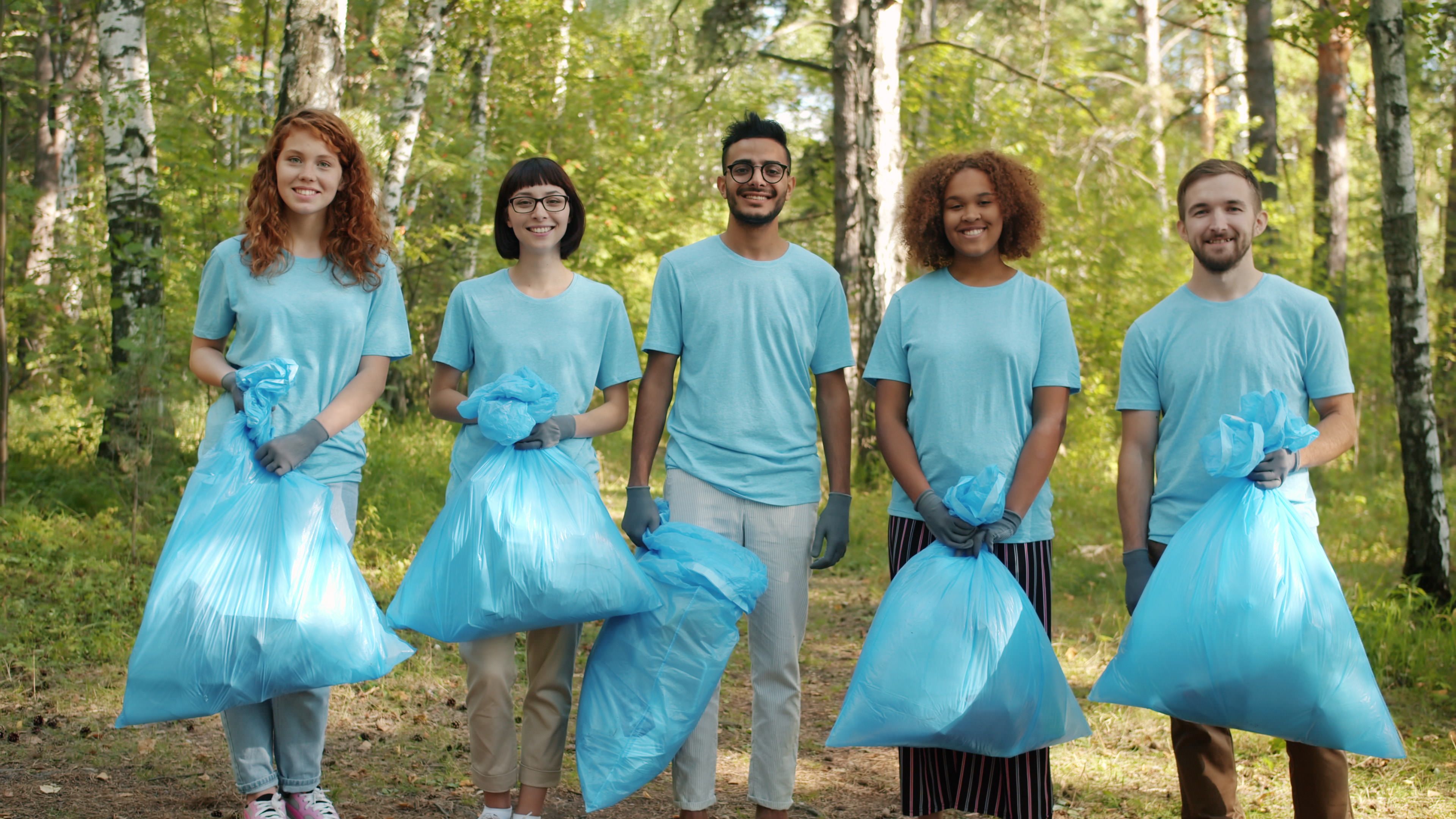 Group of Volunteers Cleaning Park Together · Free Stock Photo