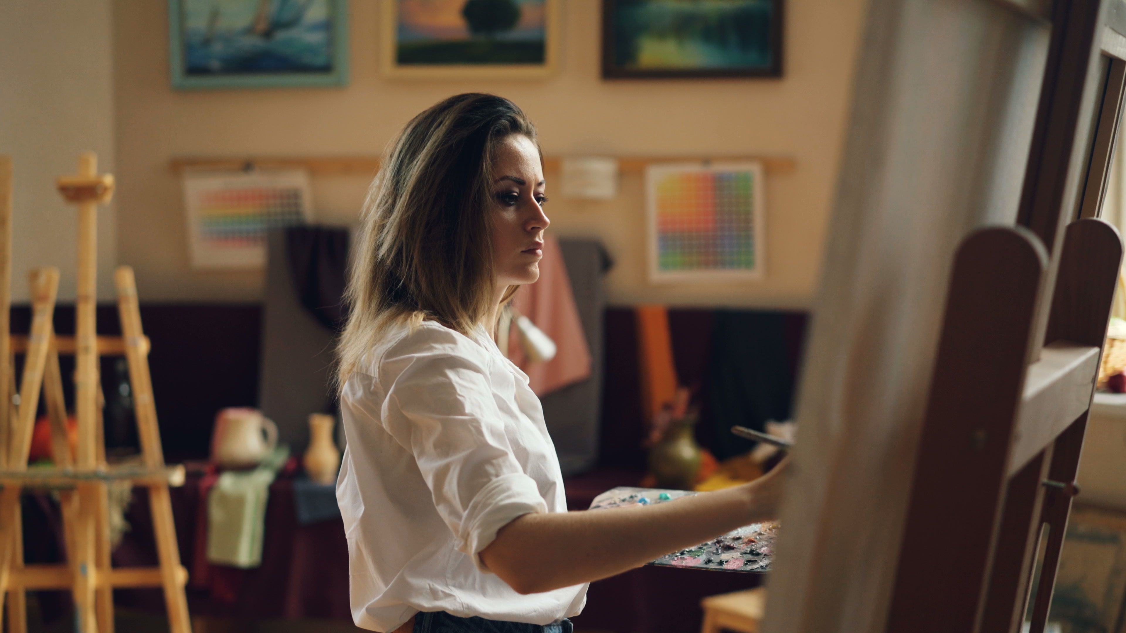 Artist Painting Rose on Canvas in Studio · Free Stock Photo