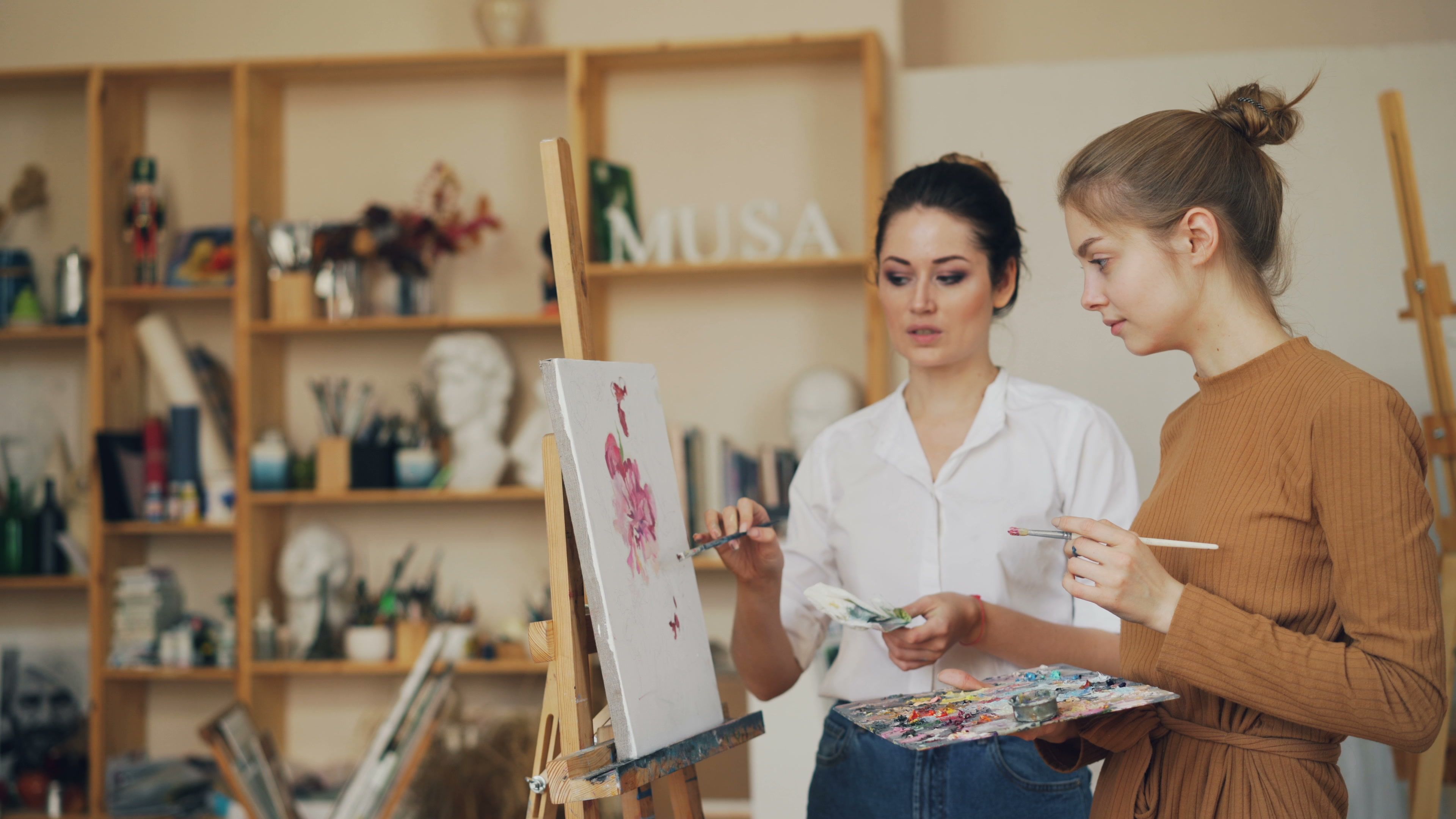 Young Artists Painting in Studio Setting · Free Stock Photo