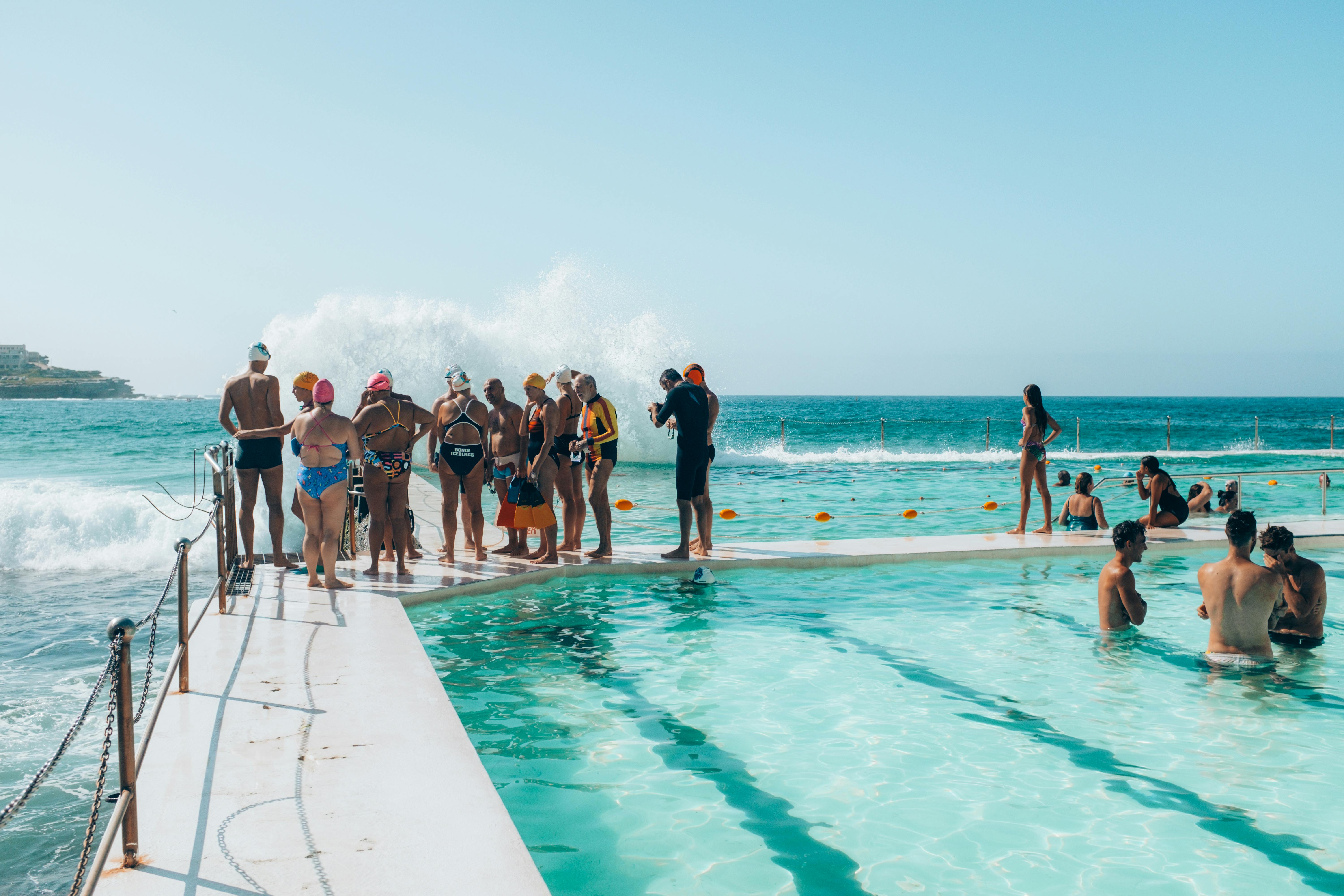 People Standing Beside Swimming Pool · Free Stock Photo