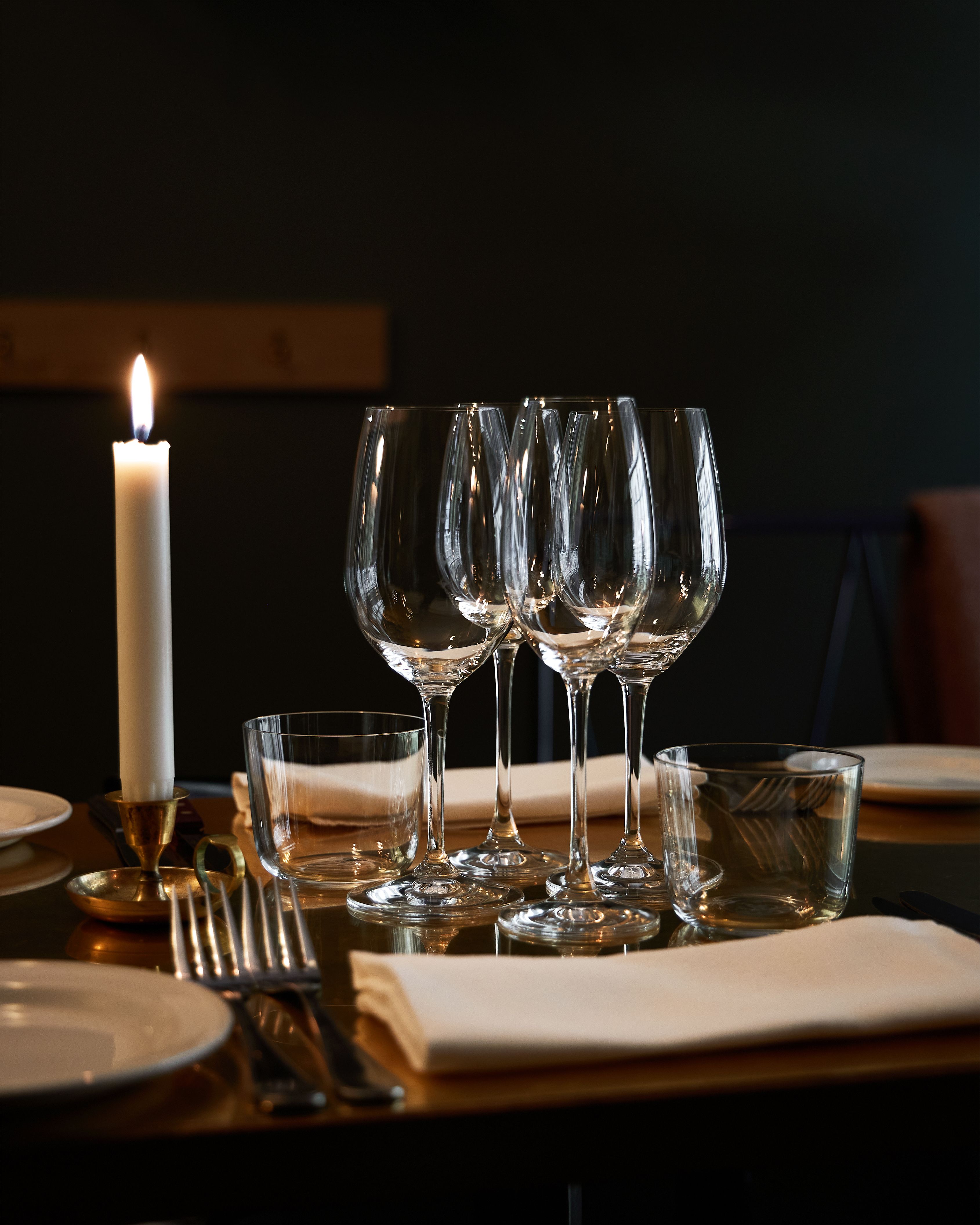 Elegant Dinner Table with Candlelight Ambiance · Free Stock Photo