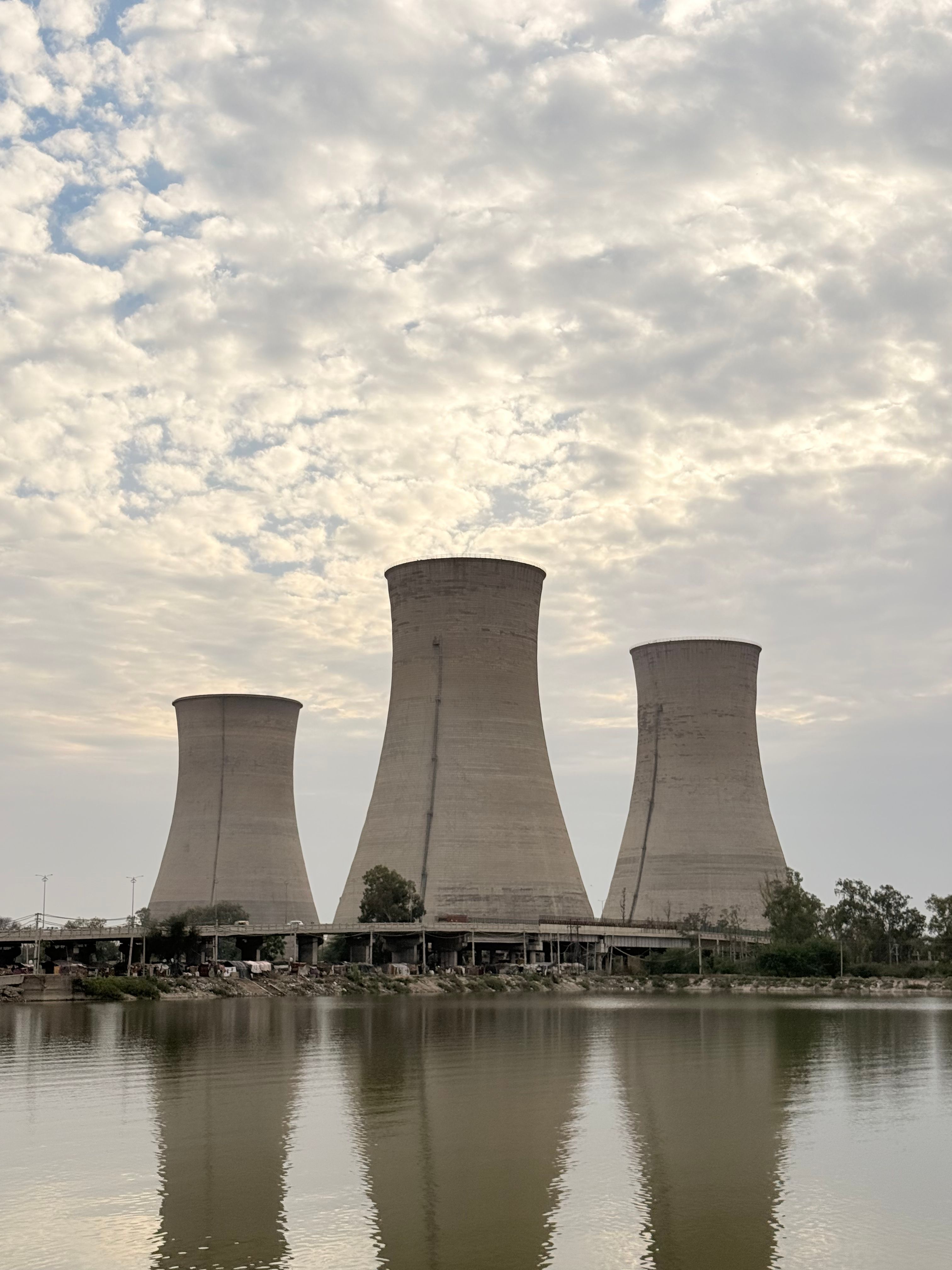 Cooling Towers Reflected on Calm Lake · Free Stock Photo