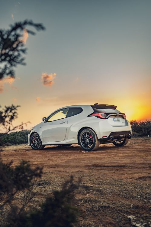 Sleek White Sports Car at Sunset · Free Stock Photo