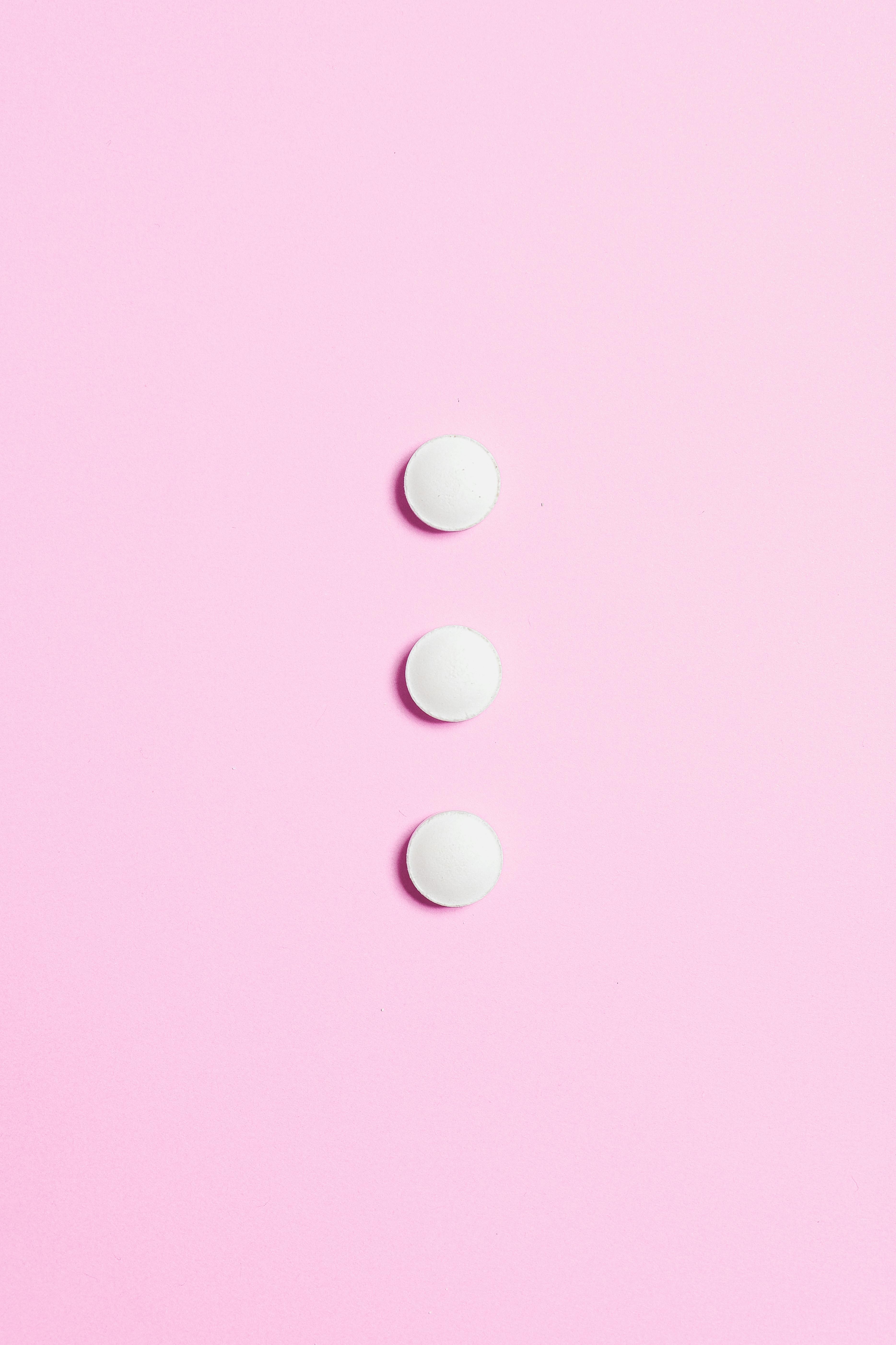 Three Tablets on Pink Background · Free Stock Photo