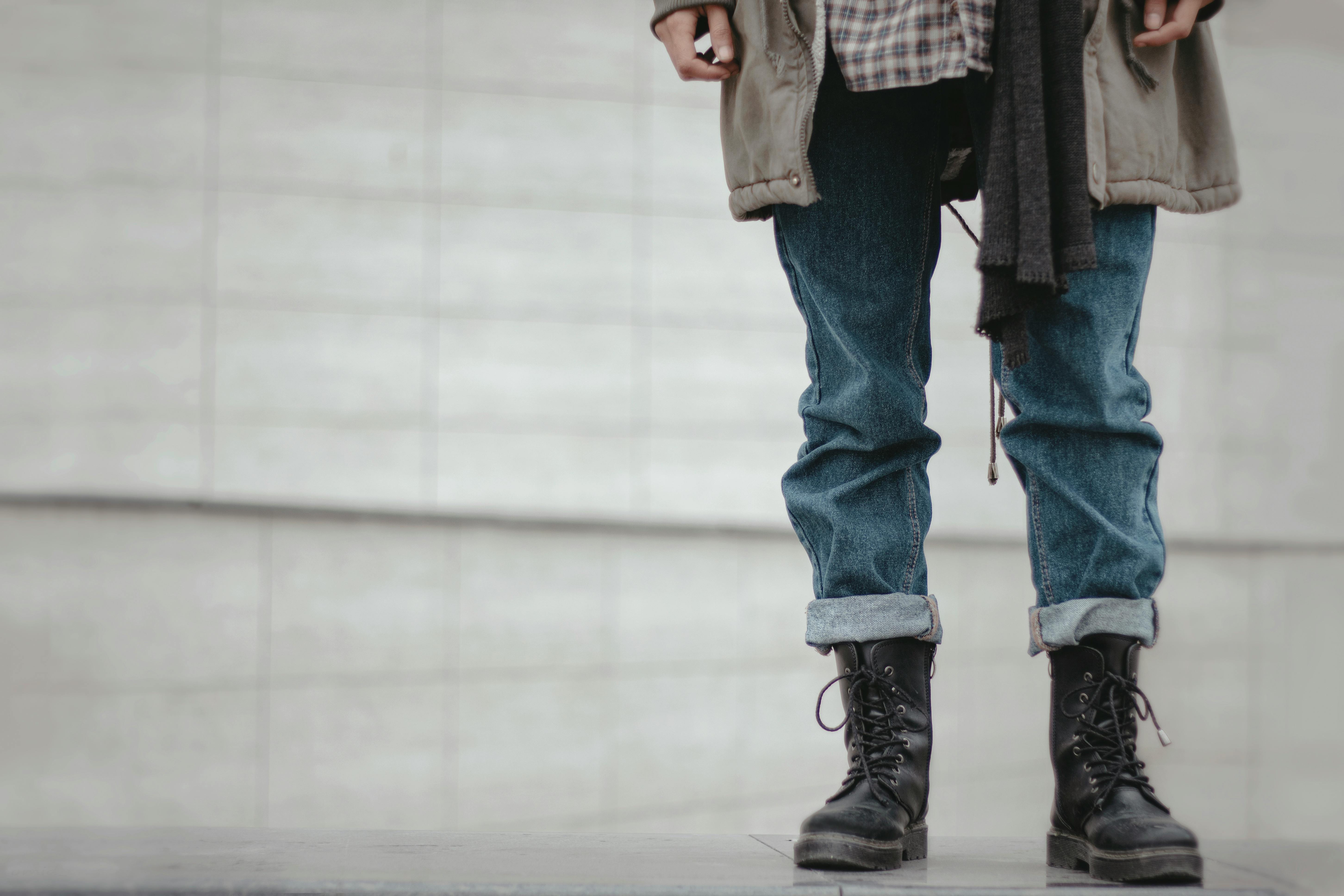 Photo Of Person Wearing Denim Pants · Free Stock Photo
