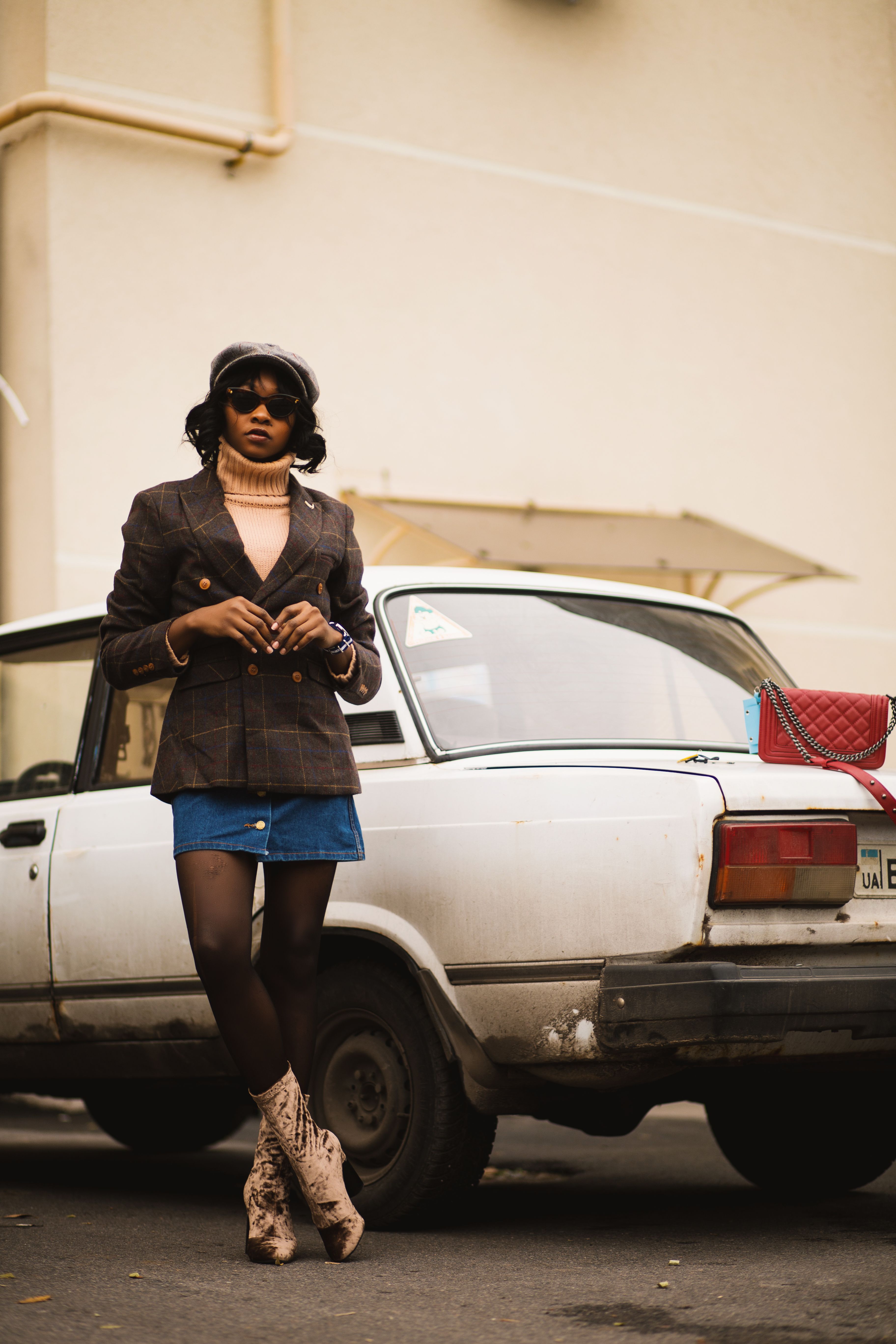 Photo Of Woman Standing Beside Car · Free Stock Photo