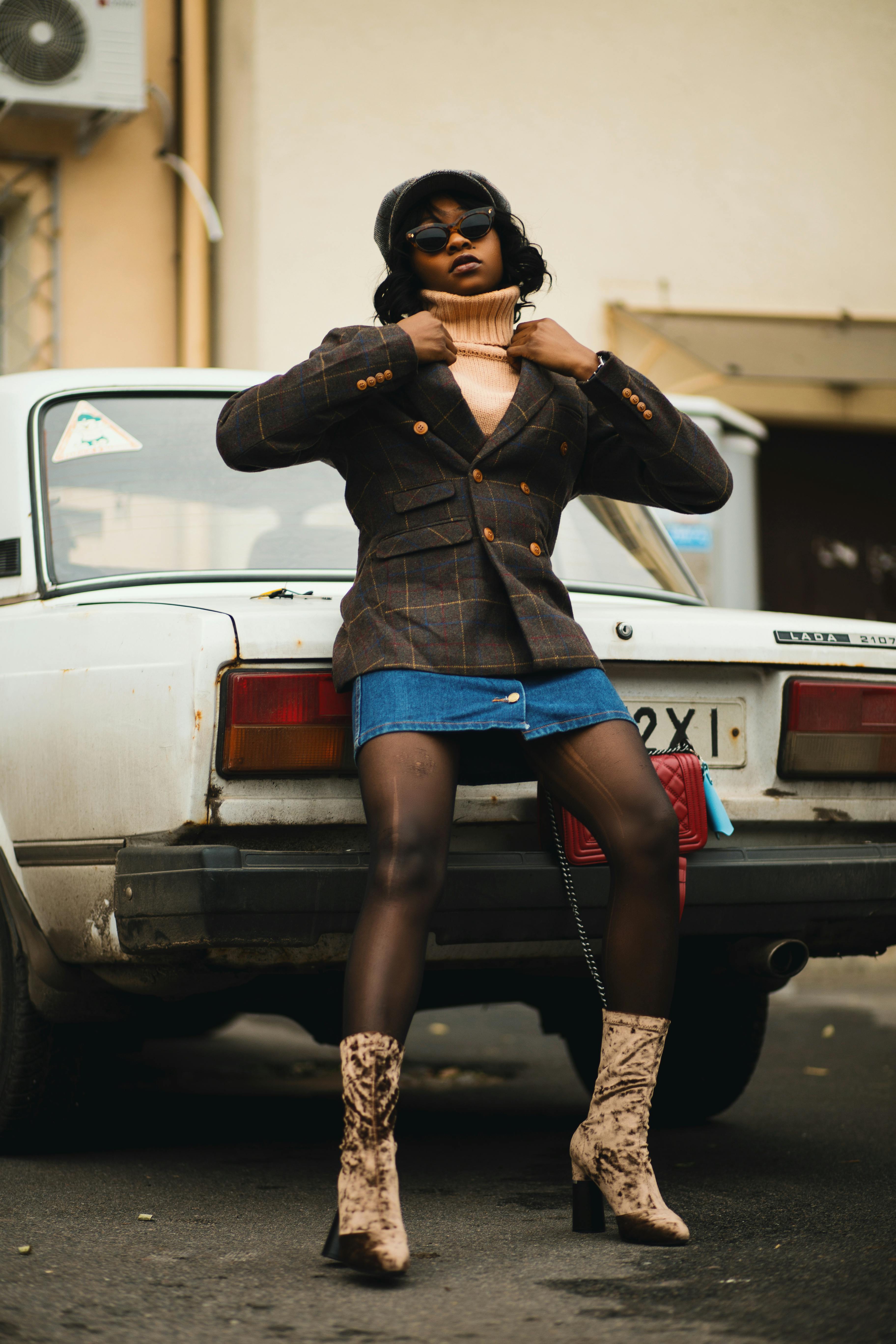 Photo Of Woman Leaning On White Car · Free Stock Photo