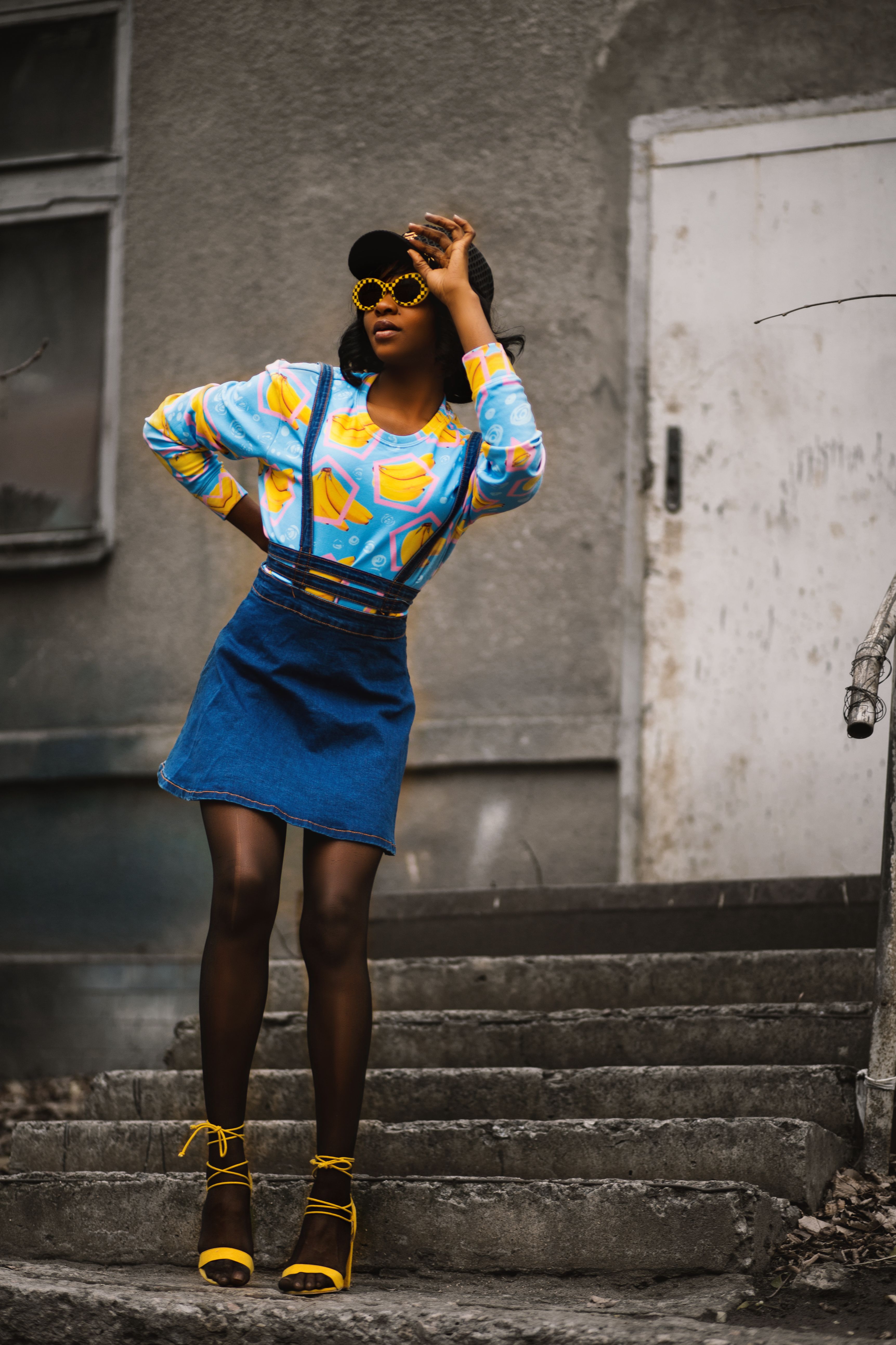 Photo Of Woman Standing On Stairs · Free Stock Photo