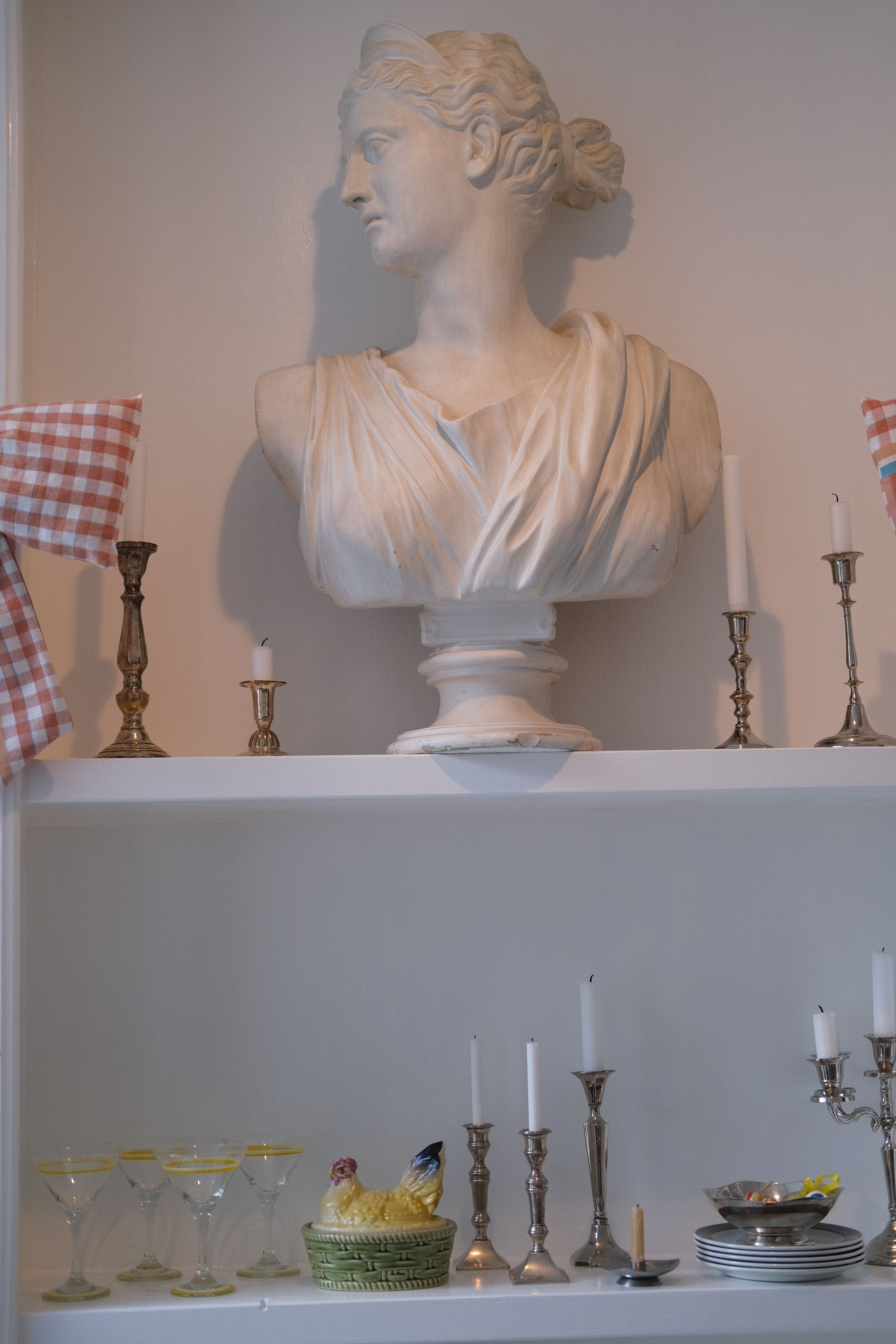 Artistic Shelf Display with Classical Bust · Free Stock Photo
