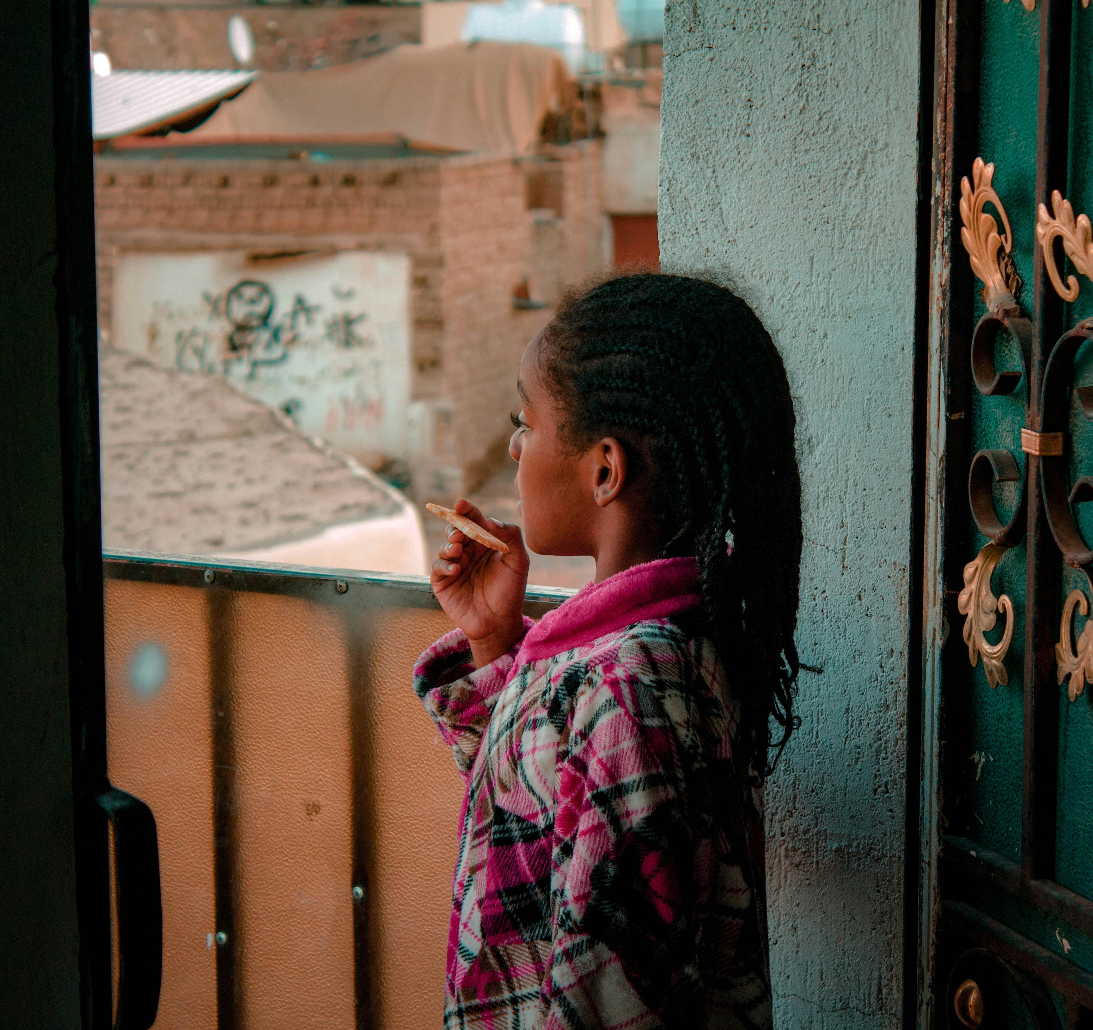 Little Girl with Braids Opening a Communion Tray in a Church · Free ...
