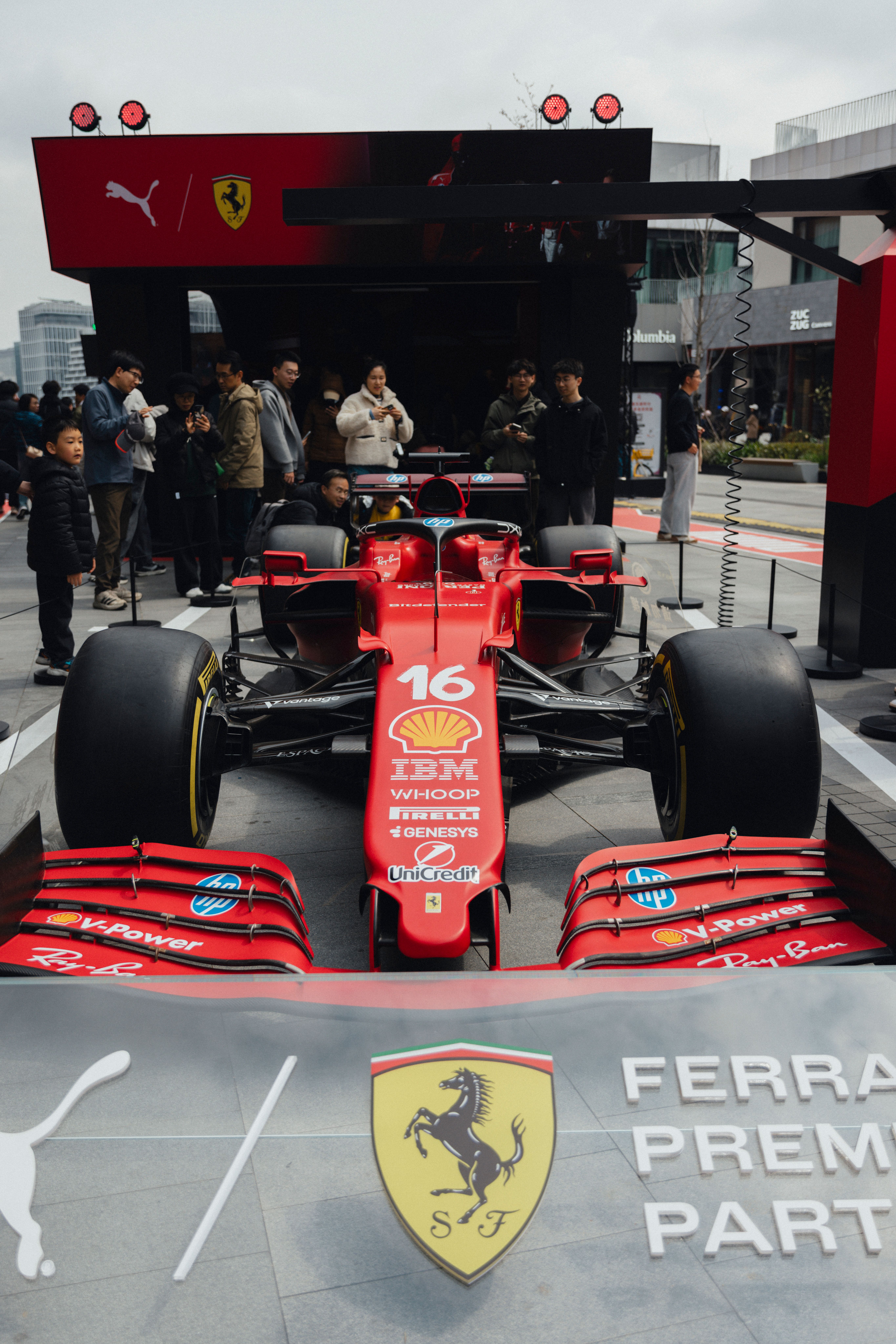 Red Formula 1 Car on Display with Crowd · Free Stock Photo