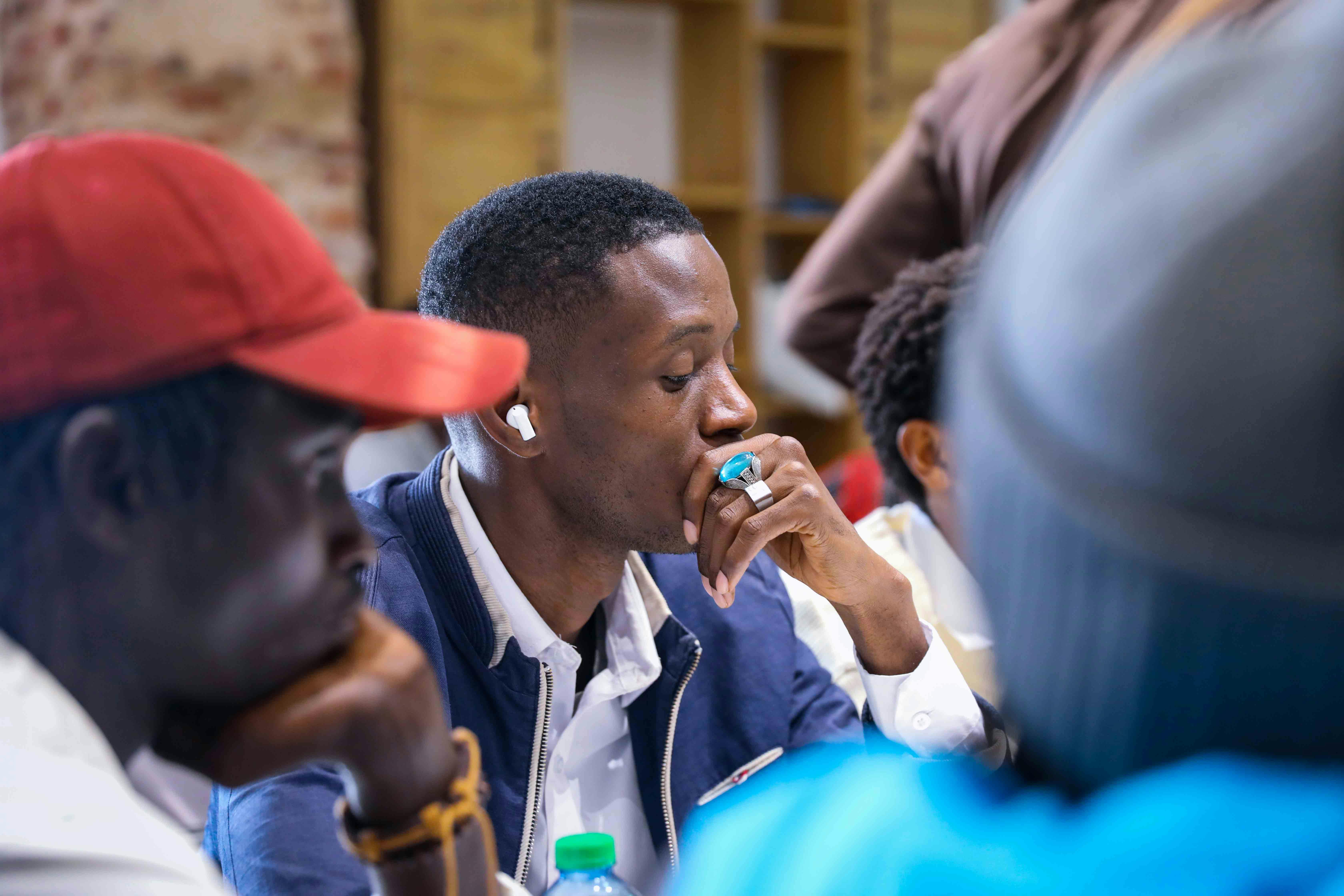 Focused Group Discussion with Diverse Participants · Free Stock Photo