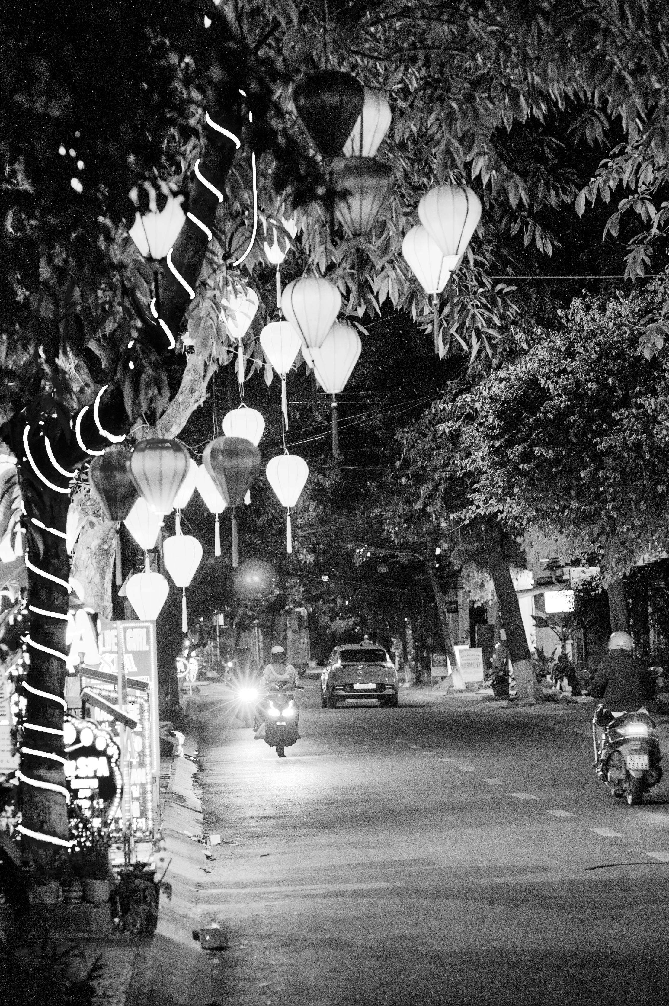 Vibrant Street with Hanging Lanterns at Night · Free Stock Photo