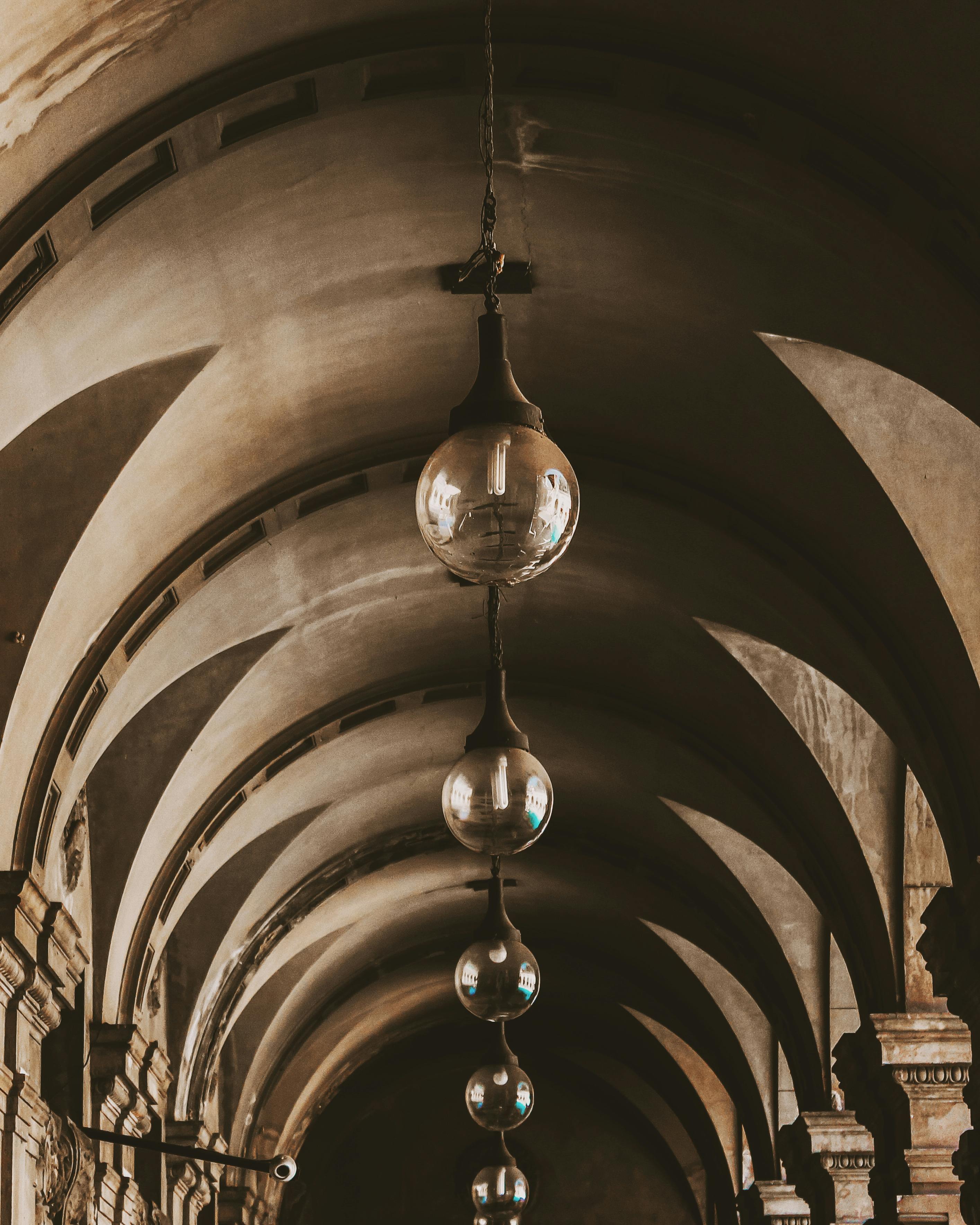 Pendant Lamps On An Arched Ceiling Of A Building · Free Stock Photo