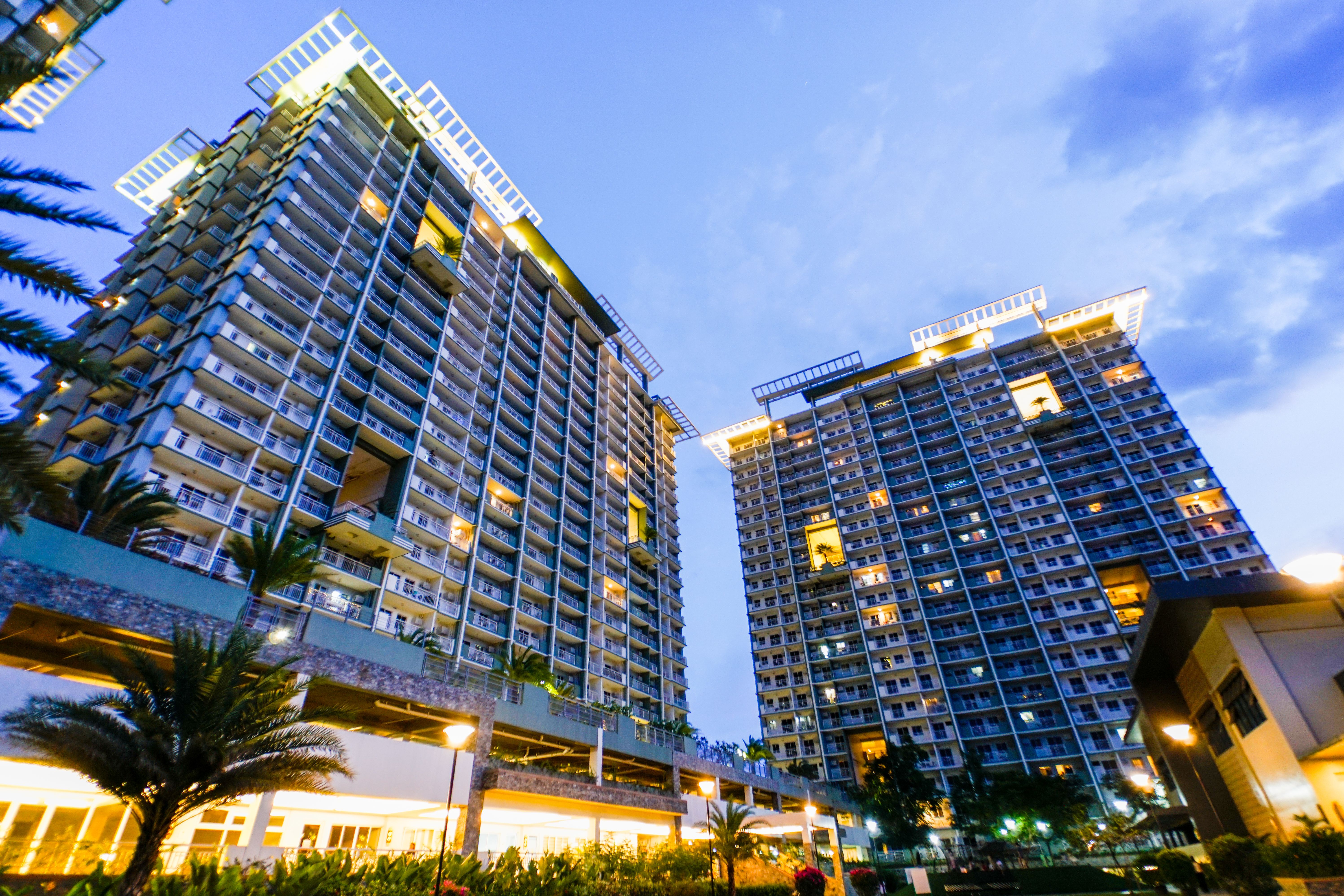 Modern High-Rise Buildings at Dusk · Free Stock Photo