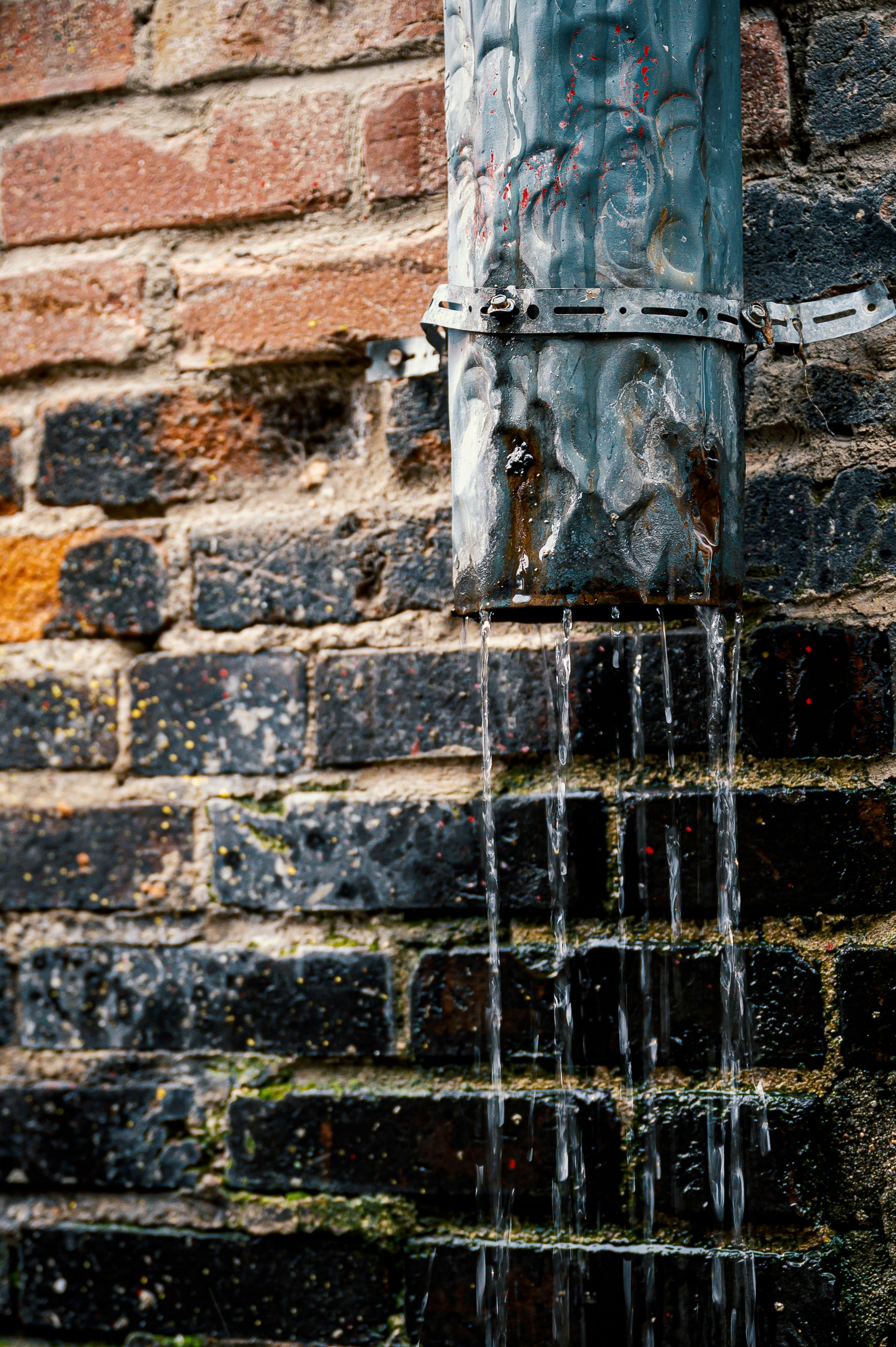 Black and Brown Brick Wall · Free Stock Photo