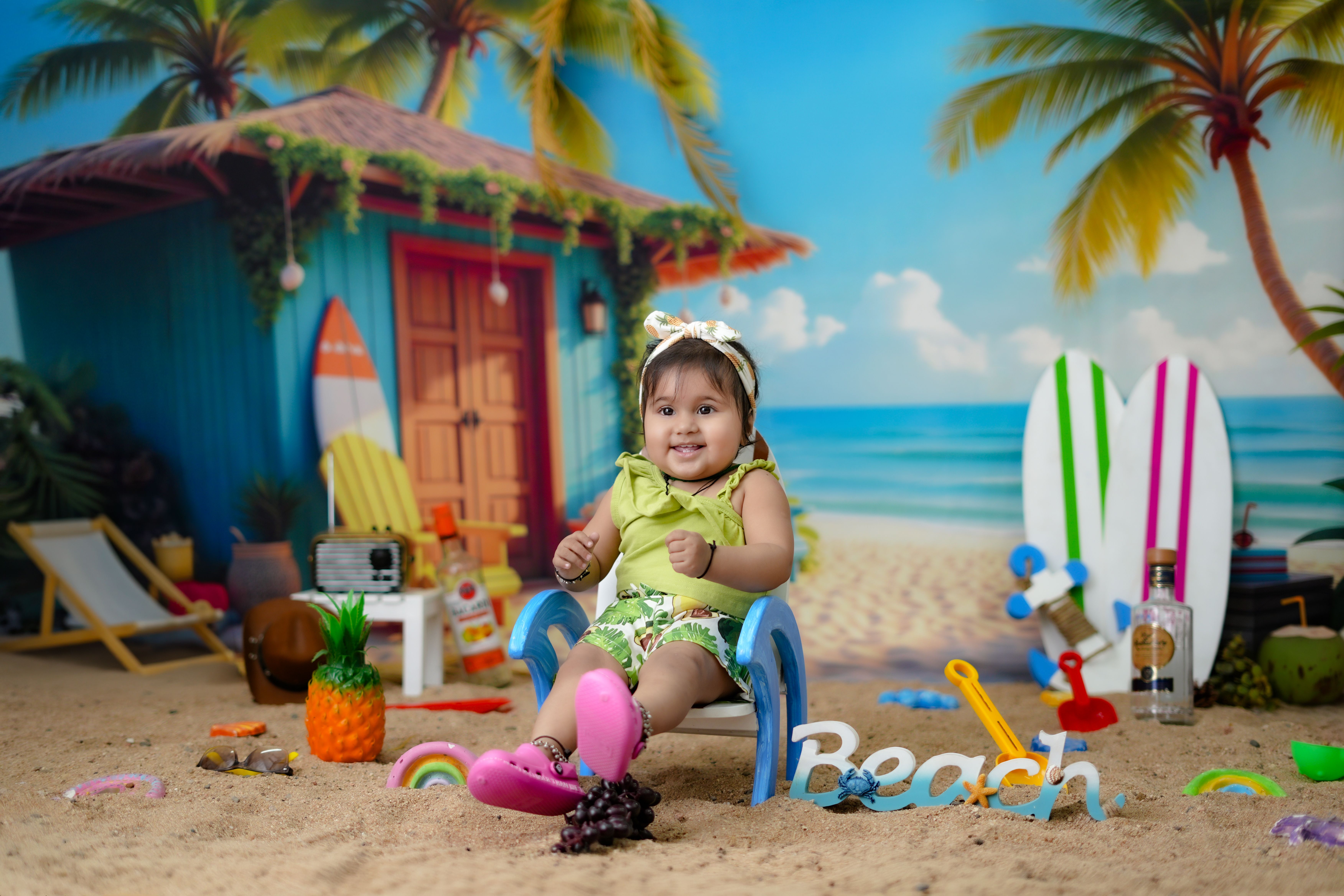 Adorable Baby on a Beach-Themed Playset · Free Stock Photo