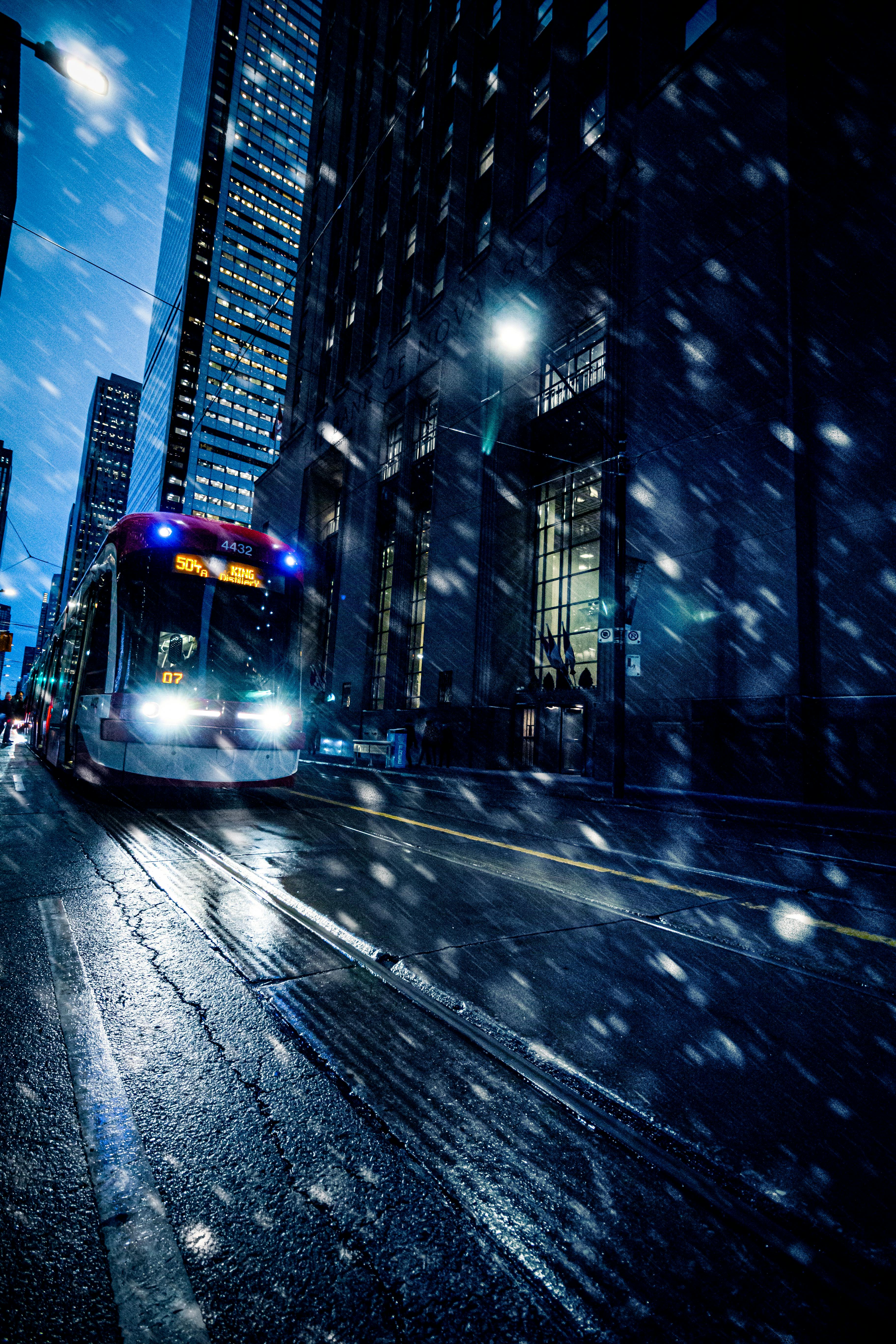 Tramway on City Street During Snowy Night · Free Stock Photo