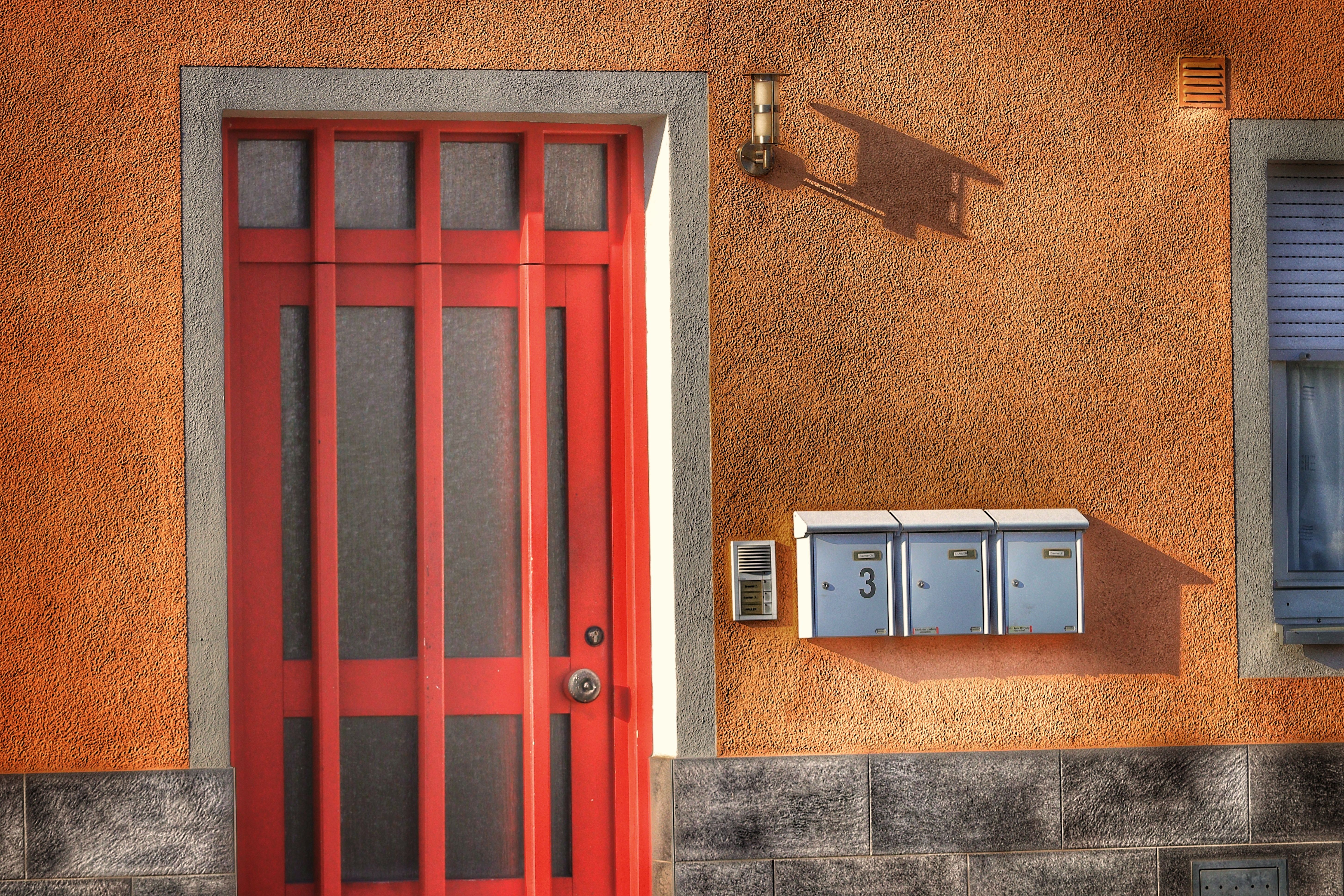 Colorful Modern House Entrance with Red Door · Free Stock Photo