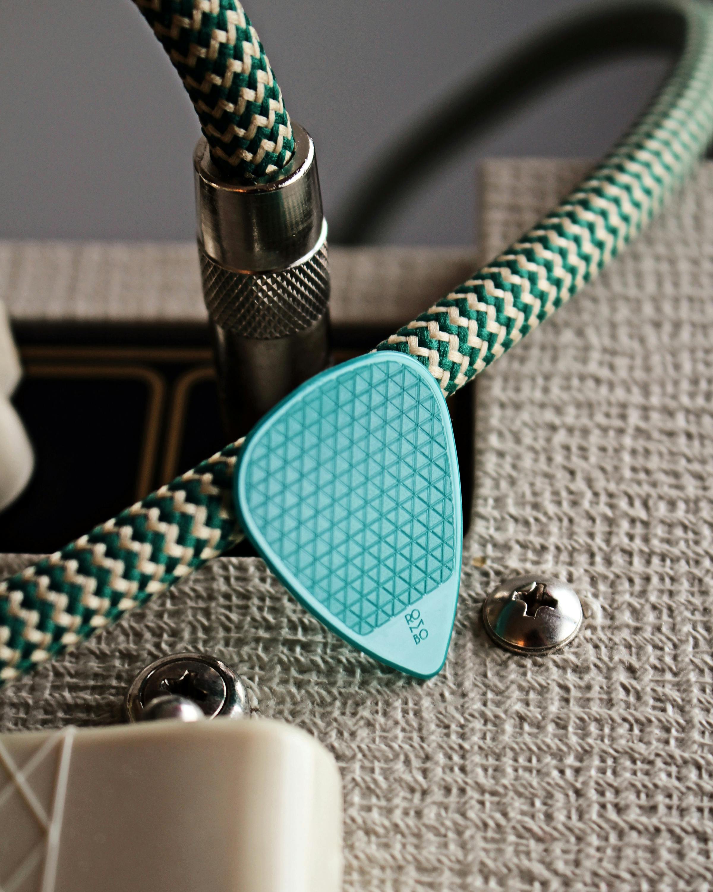 Black Plectrum on Guitar Chord · Free Stock Photo