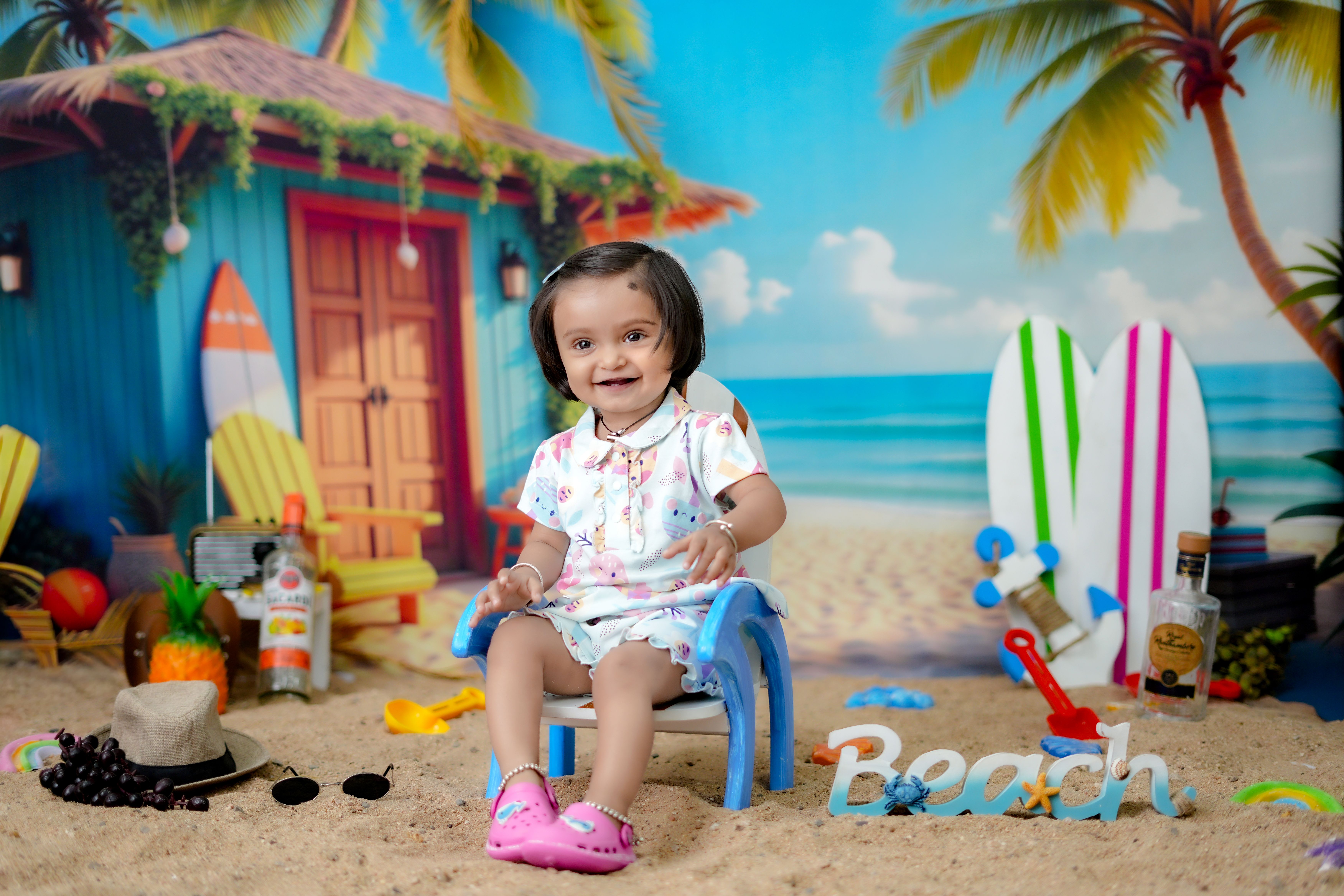 Adorable Baby on a Beach-Themed Playset · Free Stock Photo