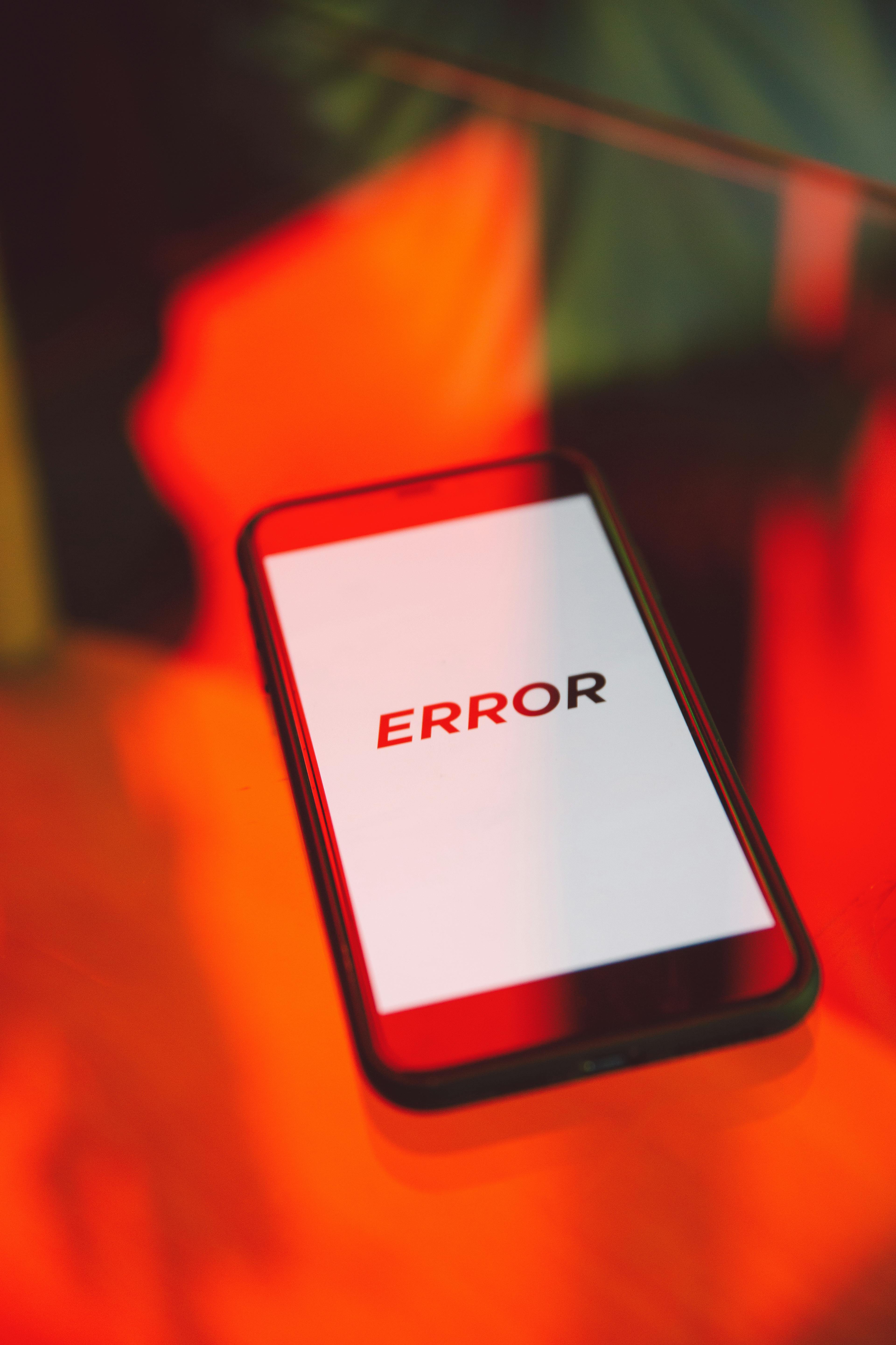 Black Smartphone Displaying Error · Free Stock Photo