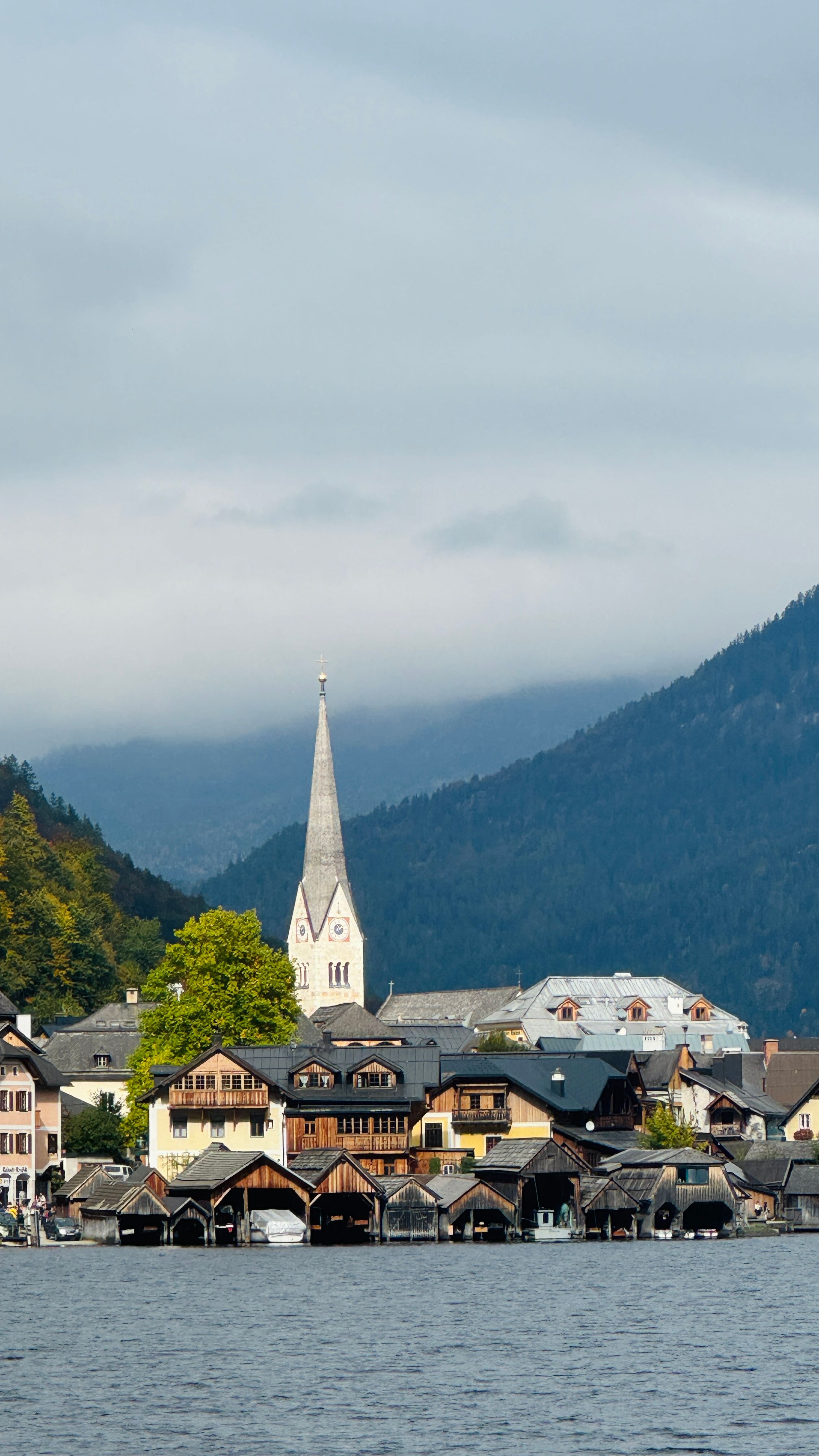 Scenic View of Hallstatt with Iconic Church Spire · Free Stock Photo