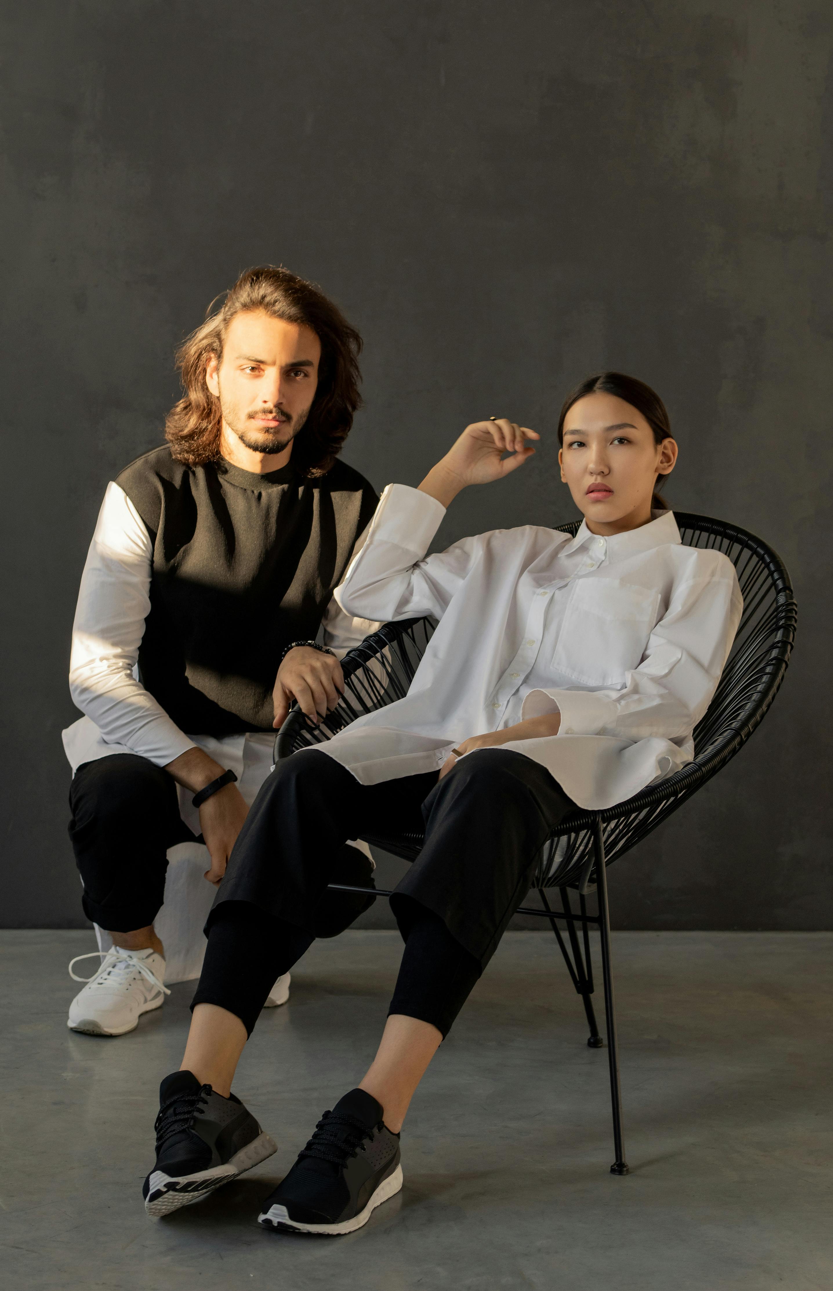 Photo Of Woman Sitting Beside Man · Free Stock Photo