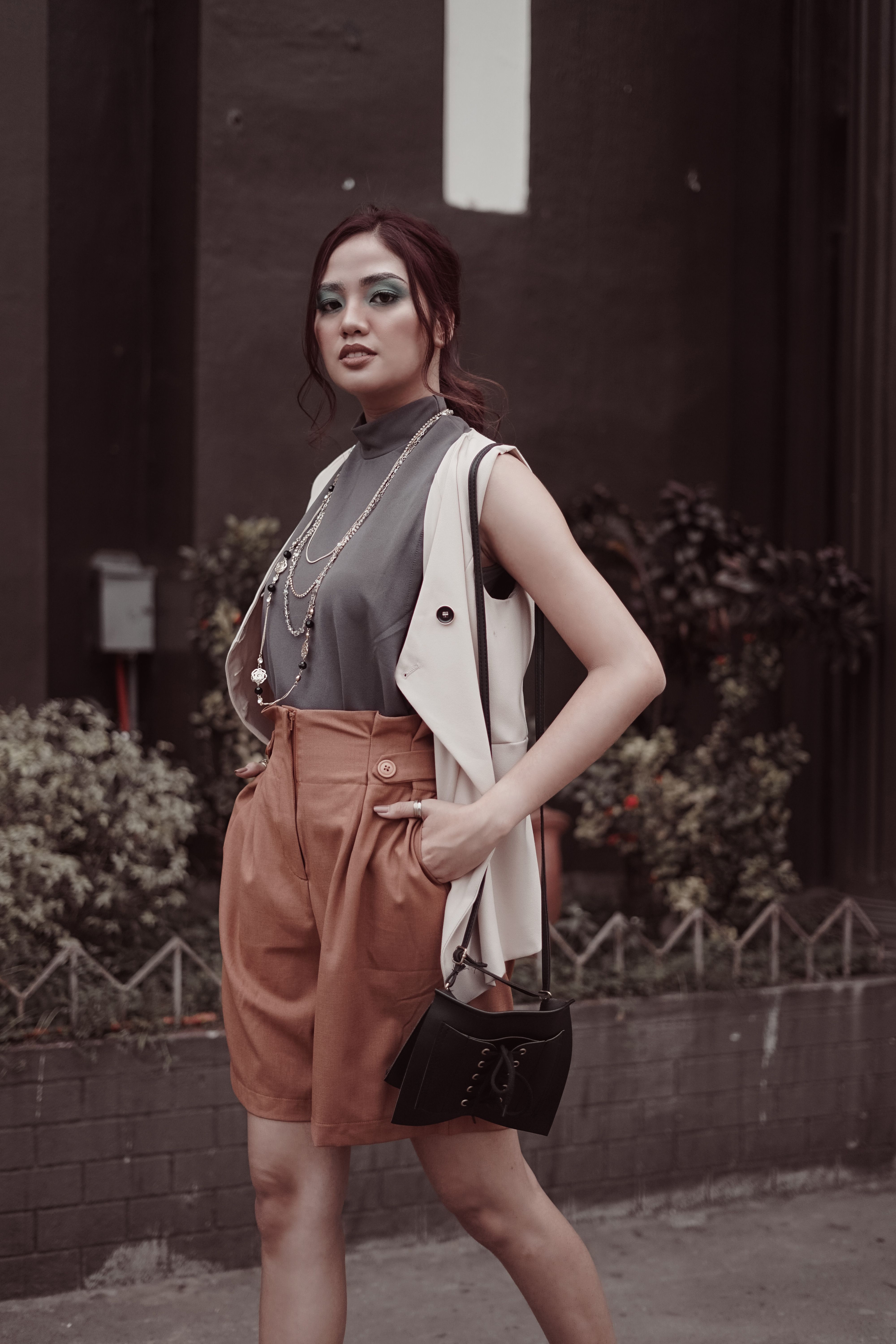 Woman Standing Beside Building · Free Stock Photo