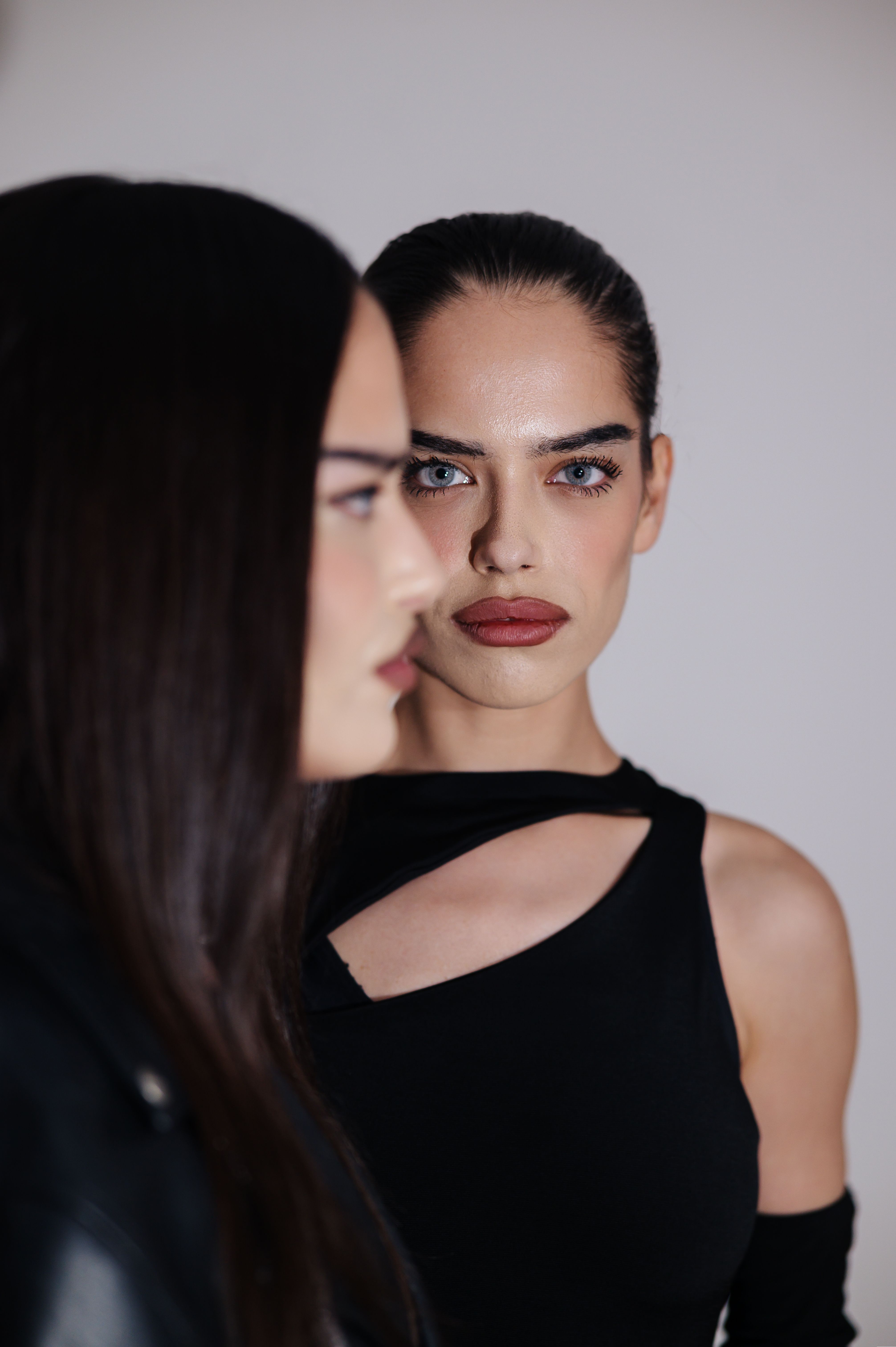 Portrait of Two Women in Stylish Modern Attire · Free Stock Photo