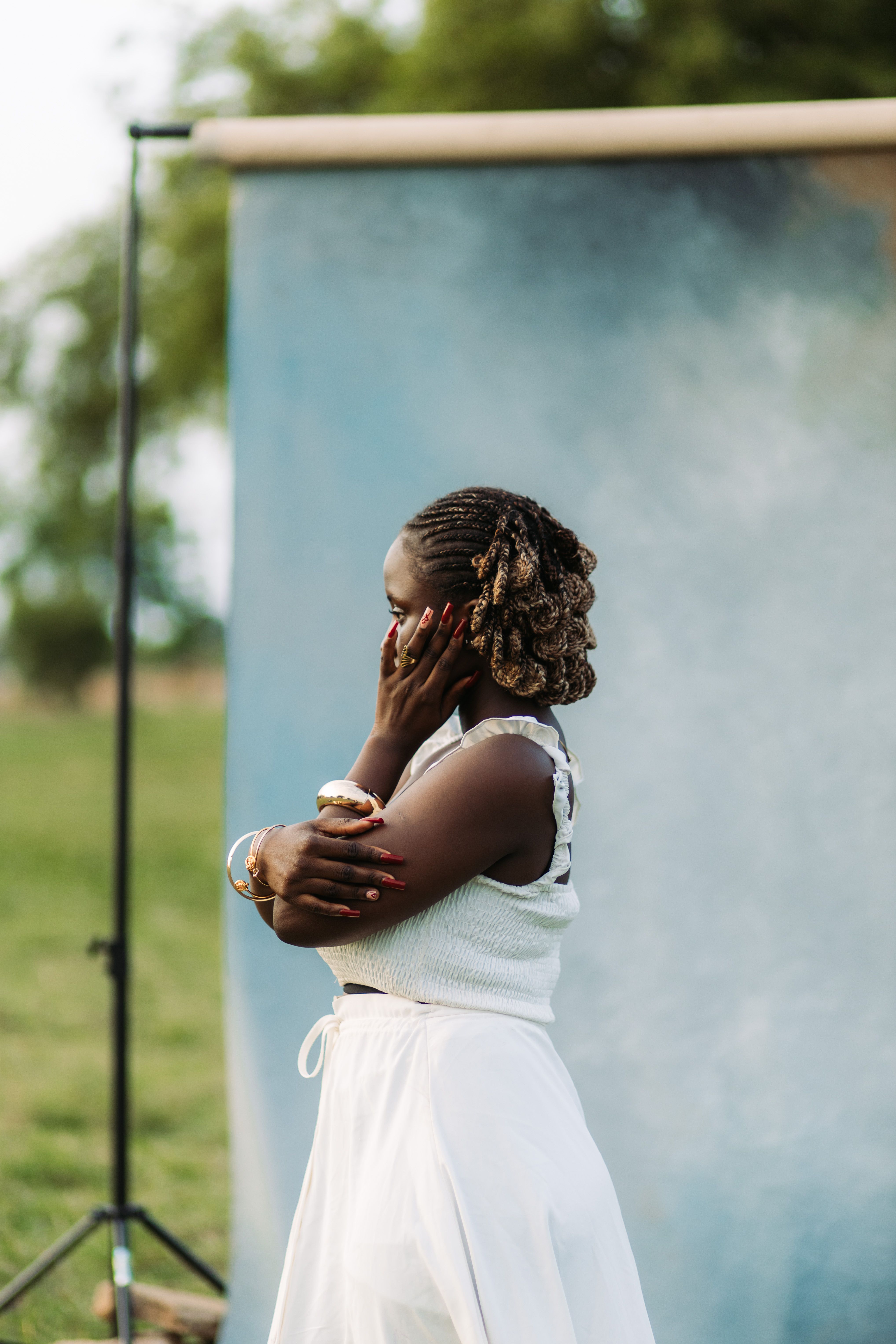 Elegant Outdoor Portrait with Backdrop · Free Stock Photo