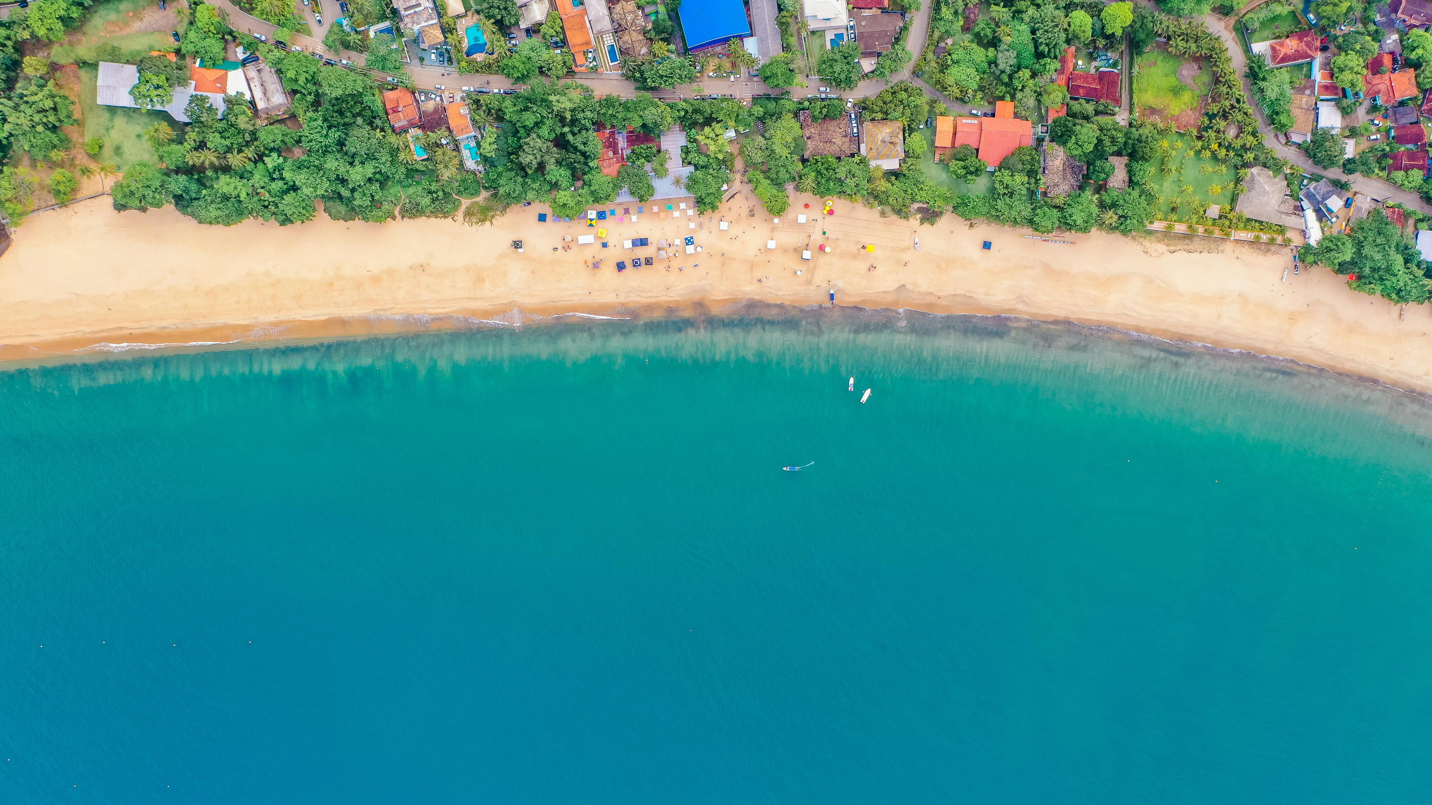 Ocean Near Sand · Free Stock Photo