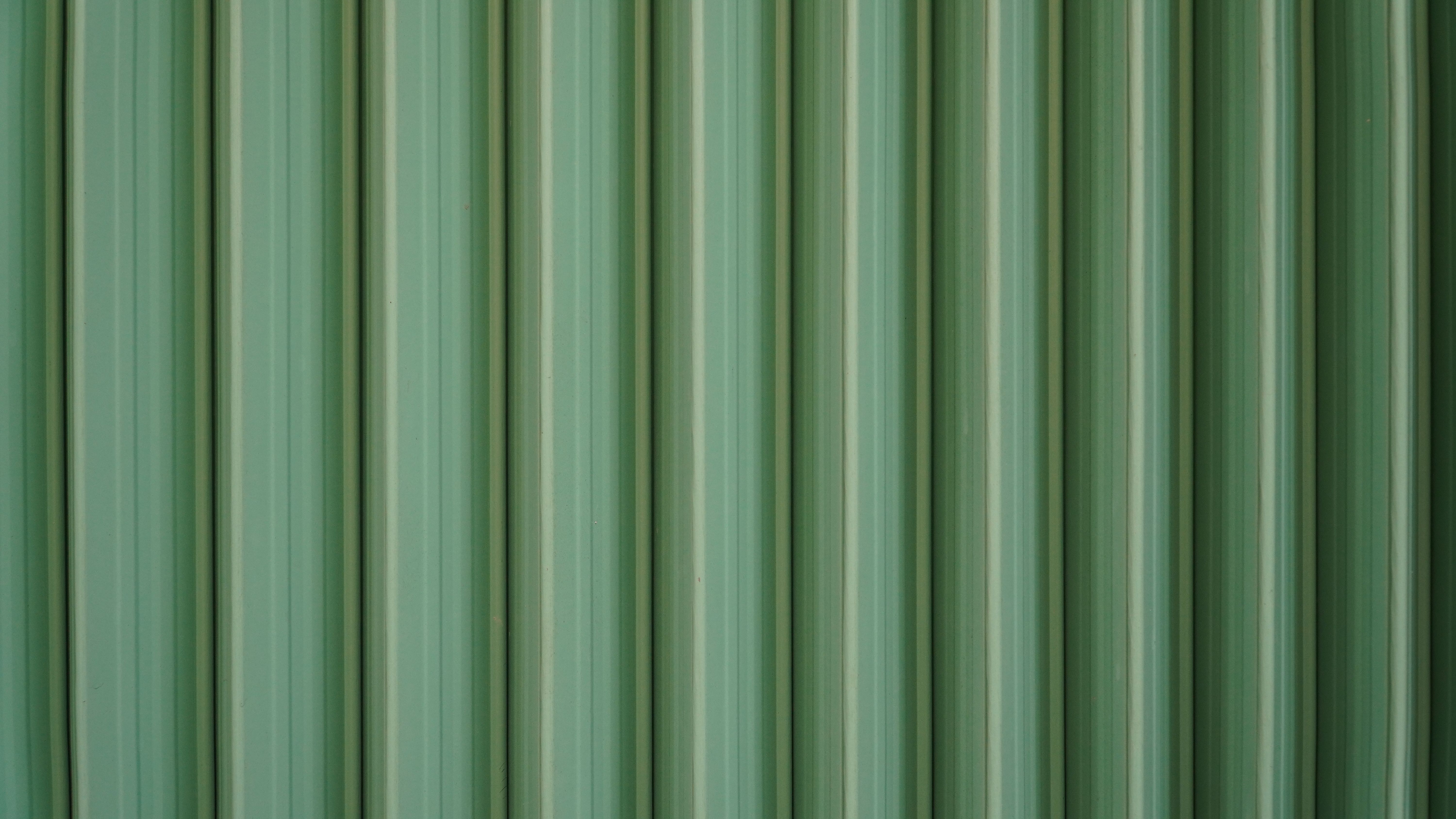 Textured Green Metal Wall with Vertical Lines · Free Stock Photo
