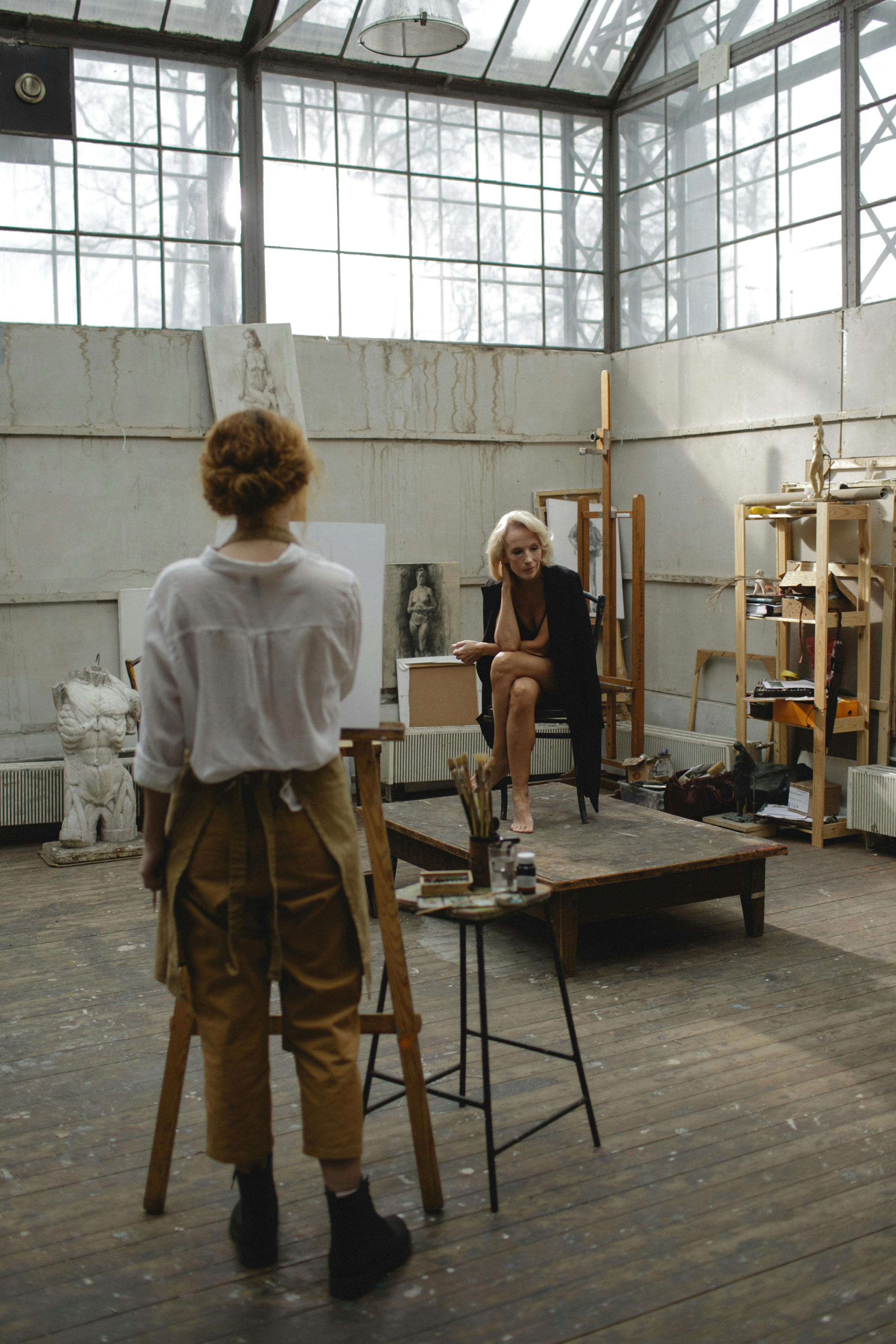 Woman Drawing a Model · Free Stock Photo