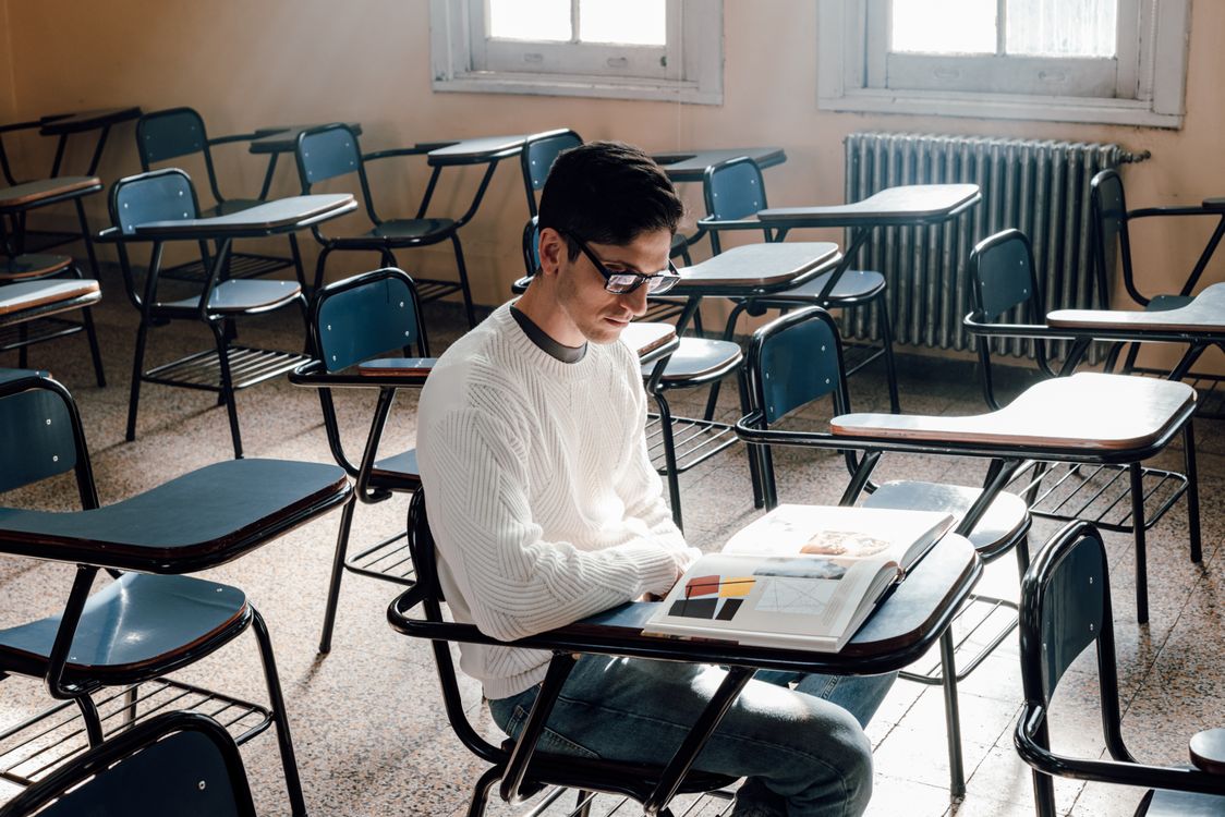 Student Studying Alone in a Buenos Aires Classroom · Free Stock Photo